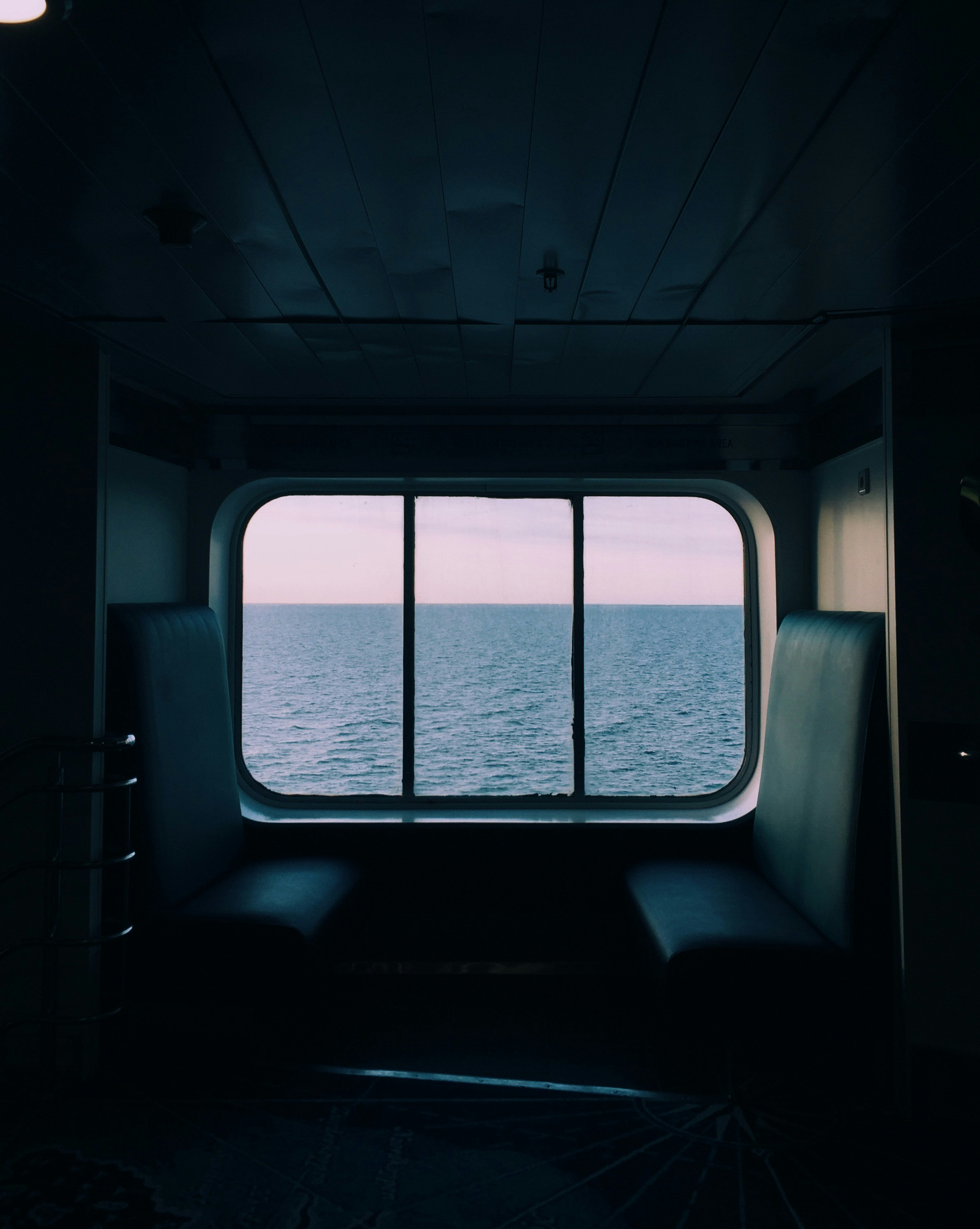A view of the ocean through a window photo – Free Sweden Image on Unsplash