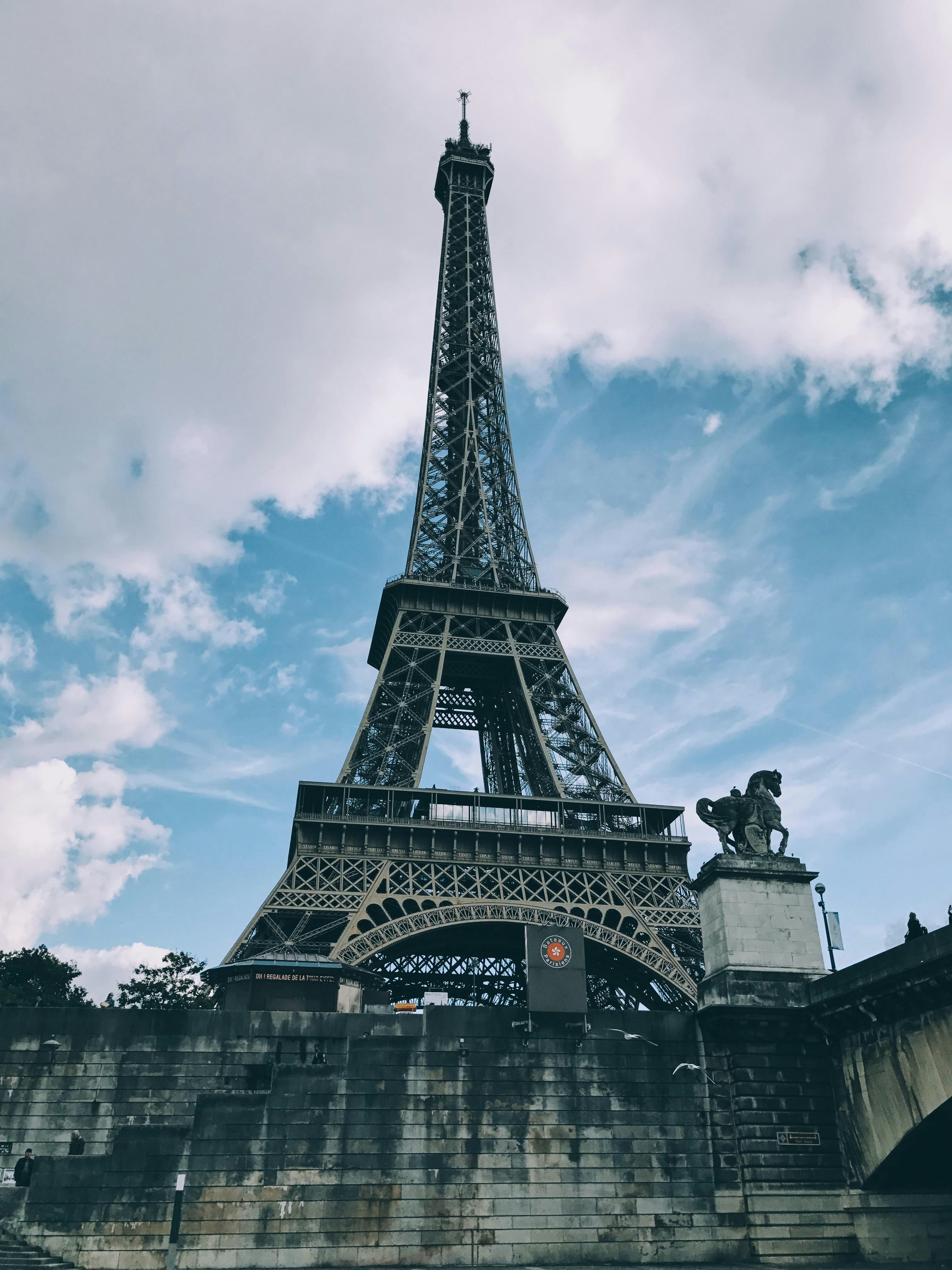 The eiffel tower towering over the city of paris photo – Free Paris ...