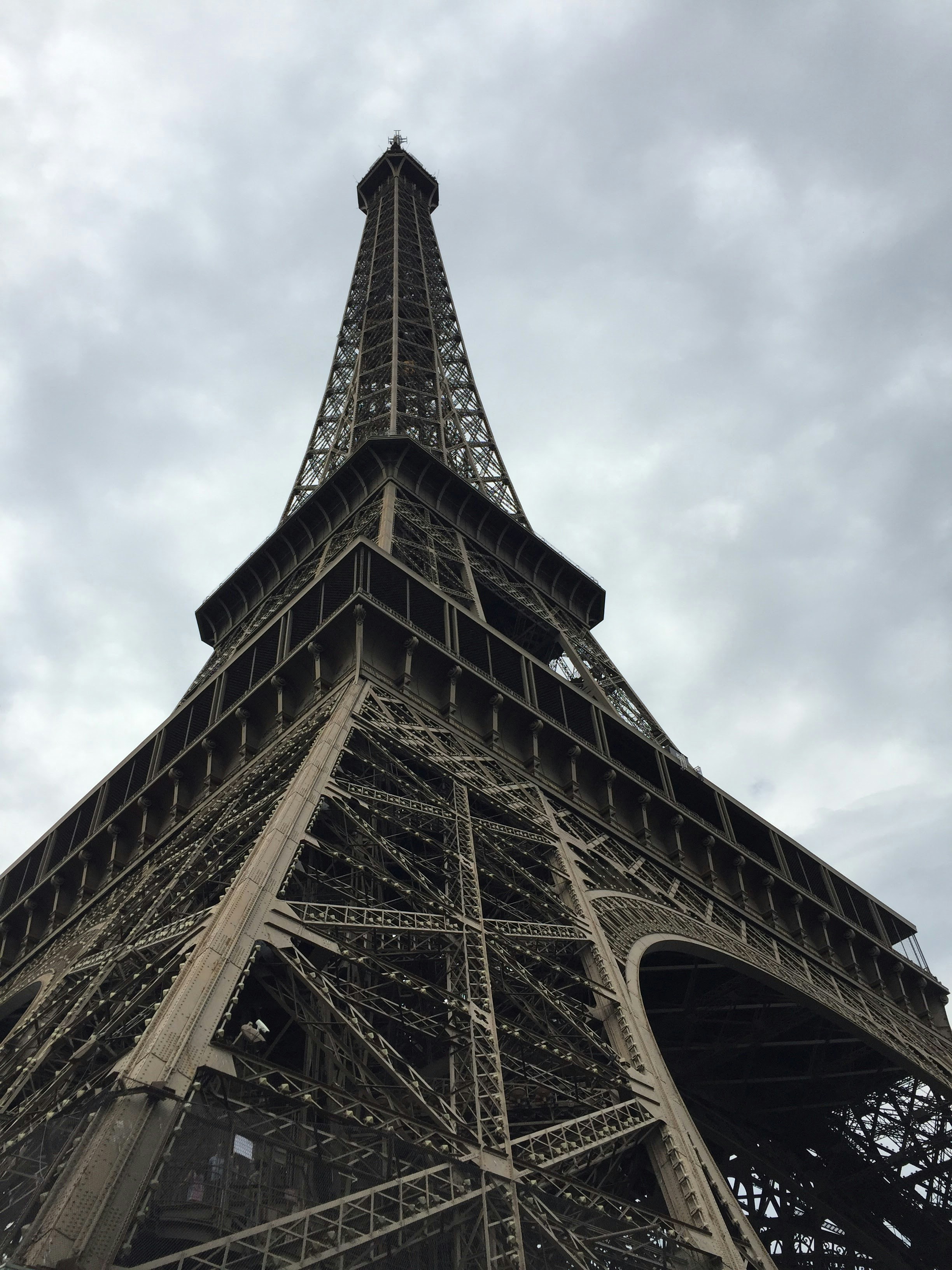 The eiffel tower towering over the city of paris photo – Free Wallpaper ...