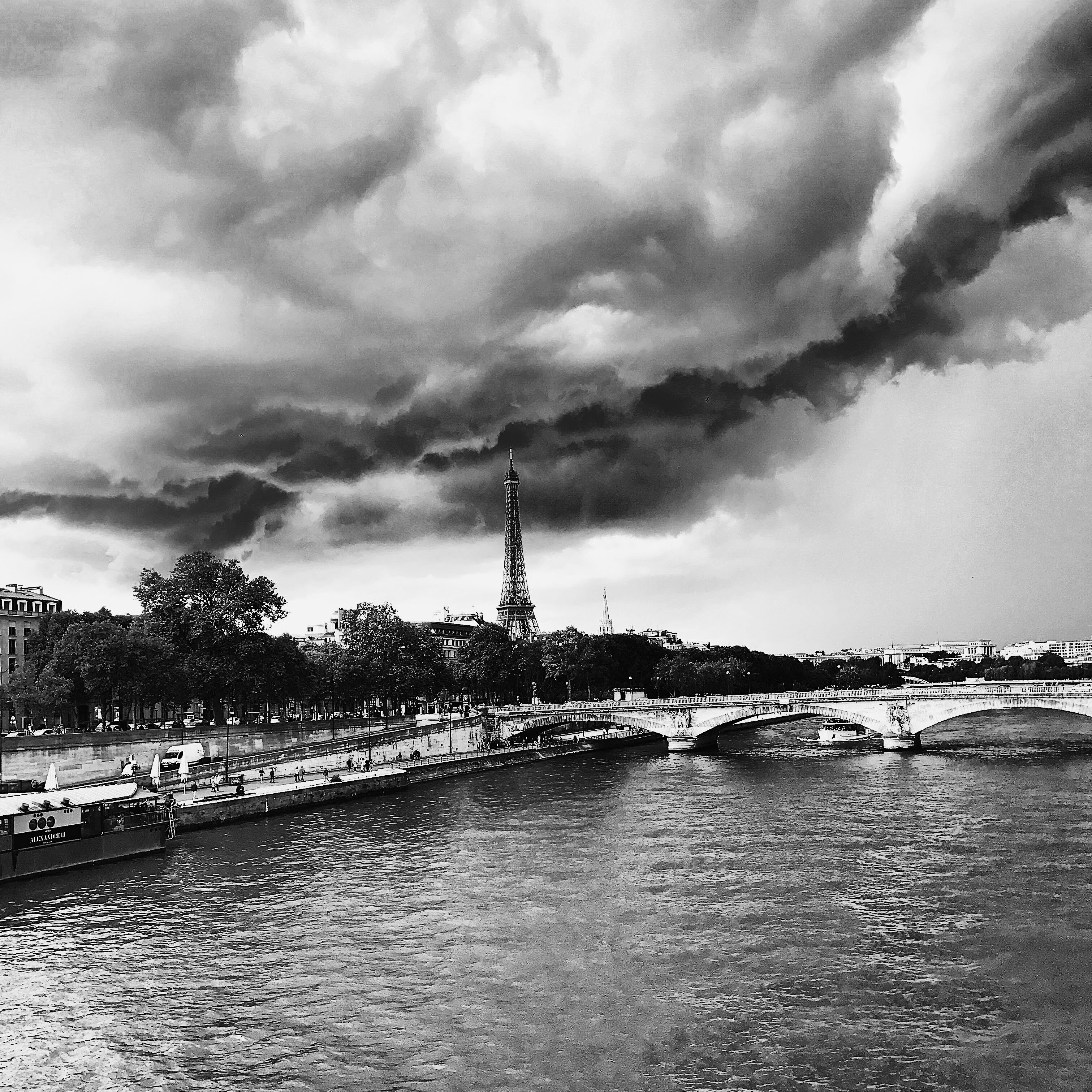 Tempest Over the Seine: Eiffel Tower Above a Storm-Lashed Horizon