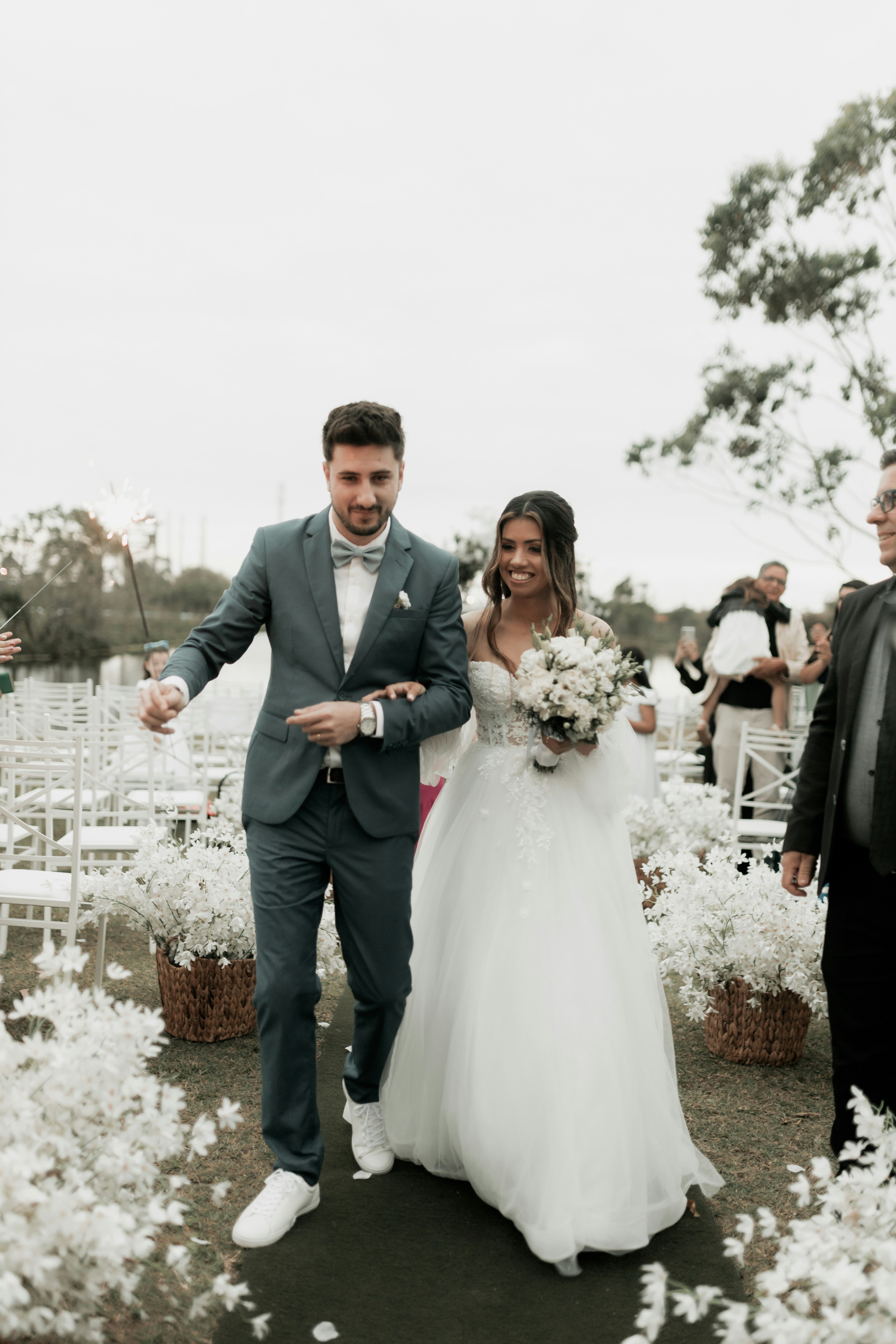 A bride and groom walking down the aisle photo – Free Flower Image on ...