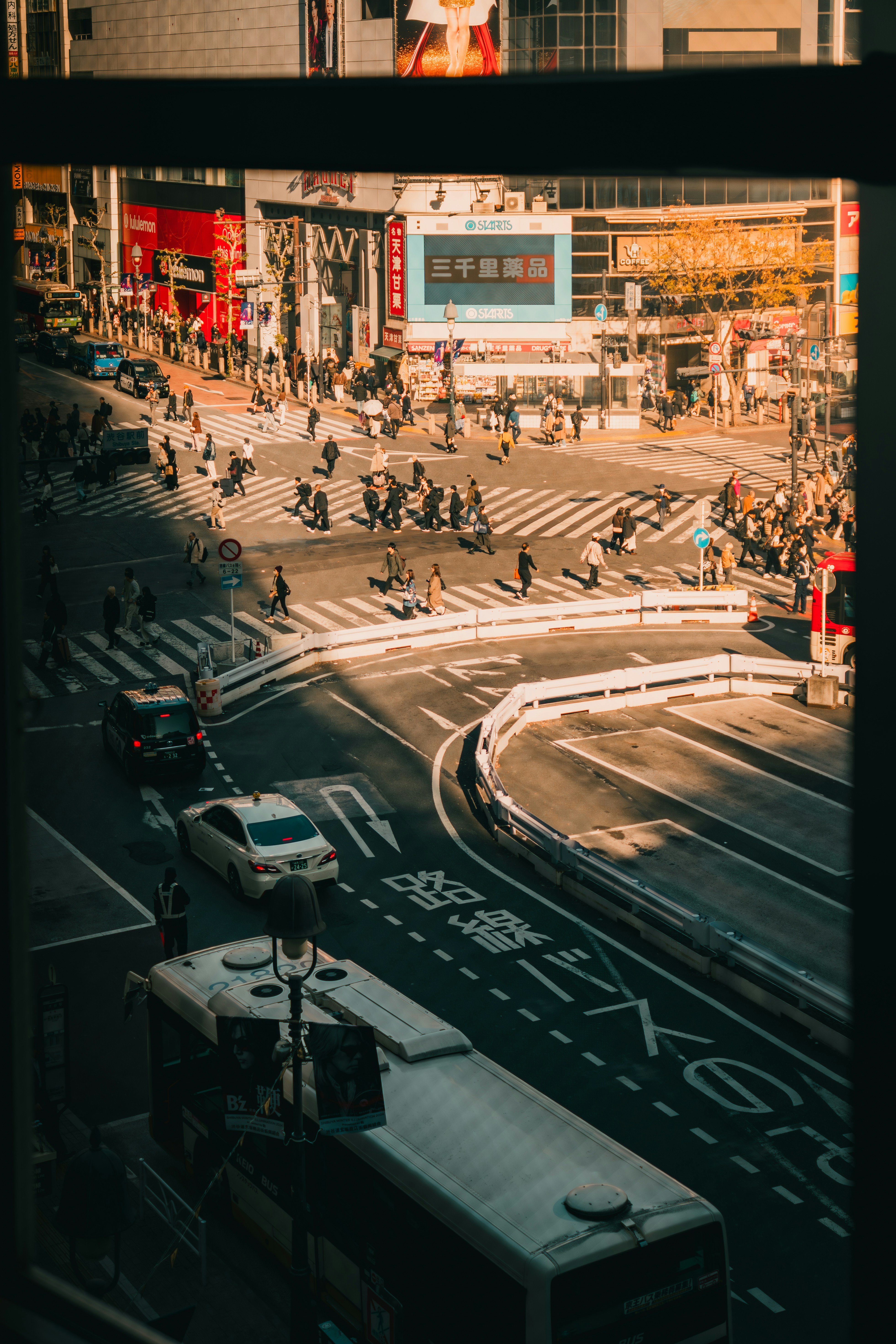 Crosswalk Pulse: Sunlit Confluence of Pedestrians and Steel