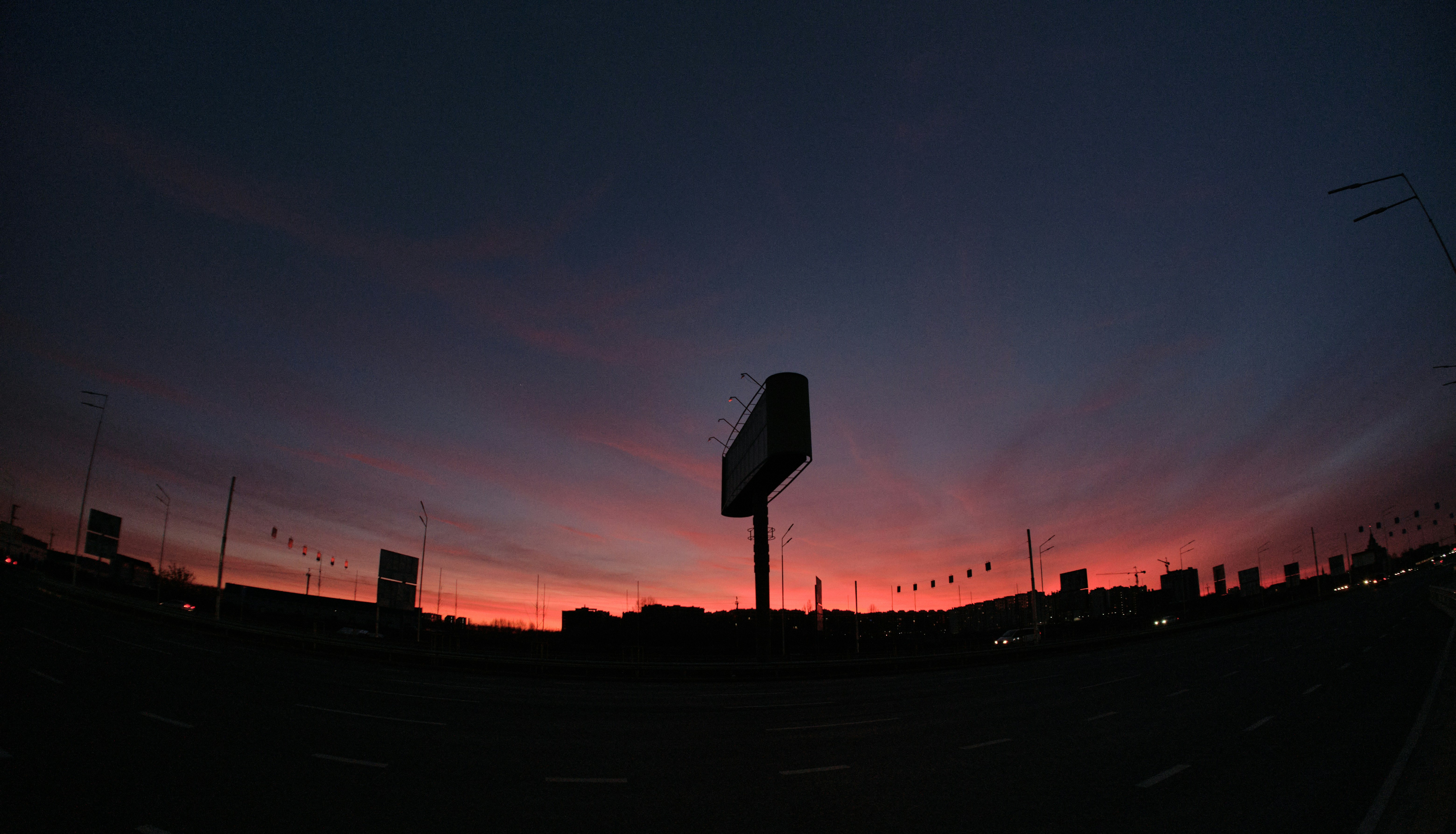 Twin-Tone Skyline: A Quiet Sunset Over an Empty Highway