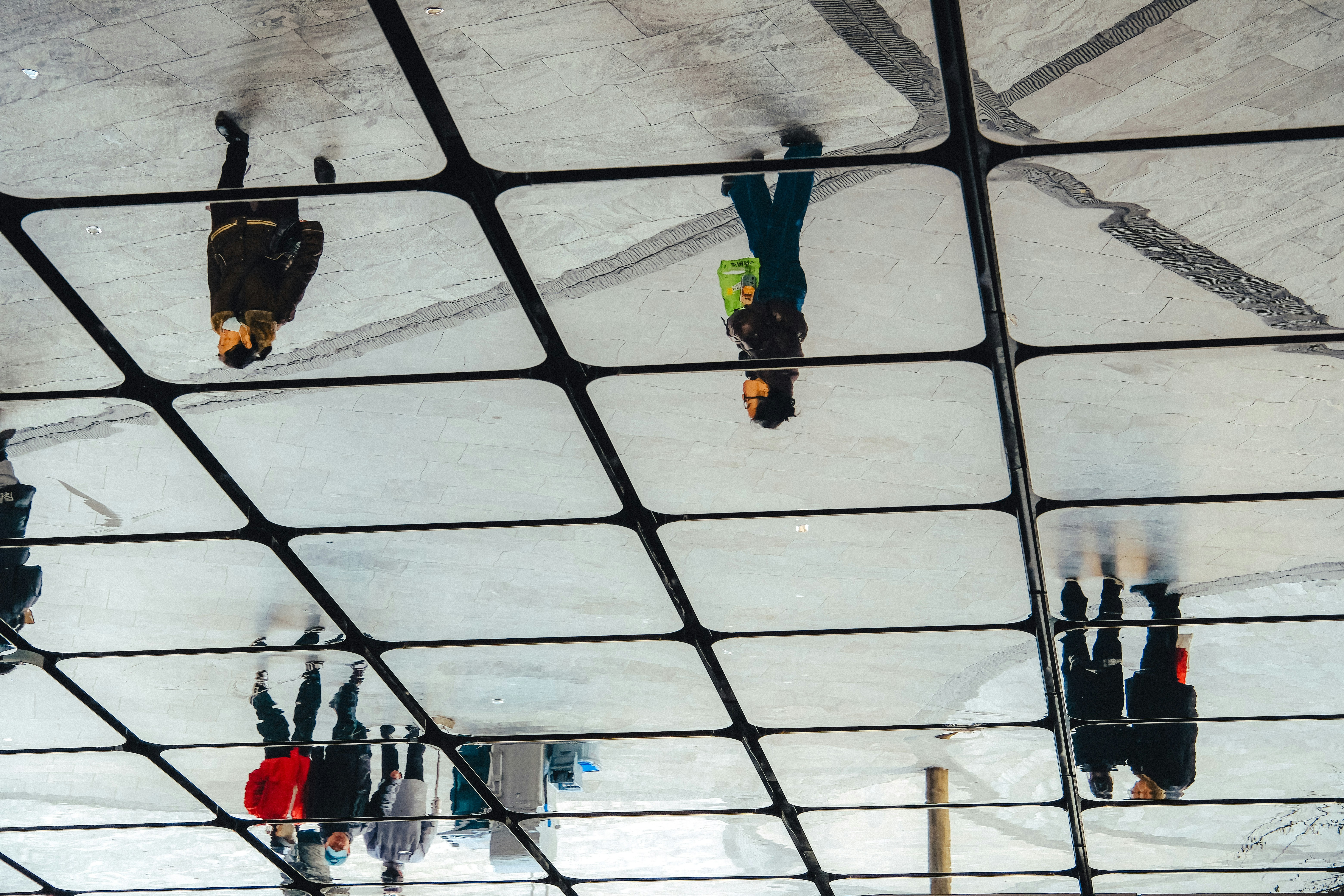 A group of people hanging upside down in the snow photo – Free Outdoors ...