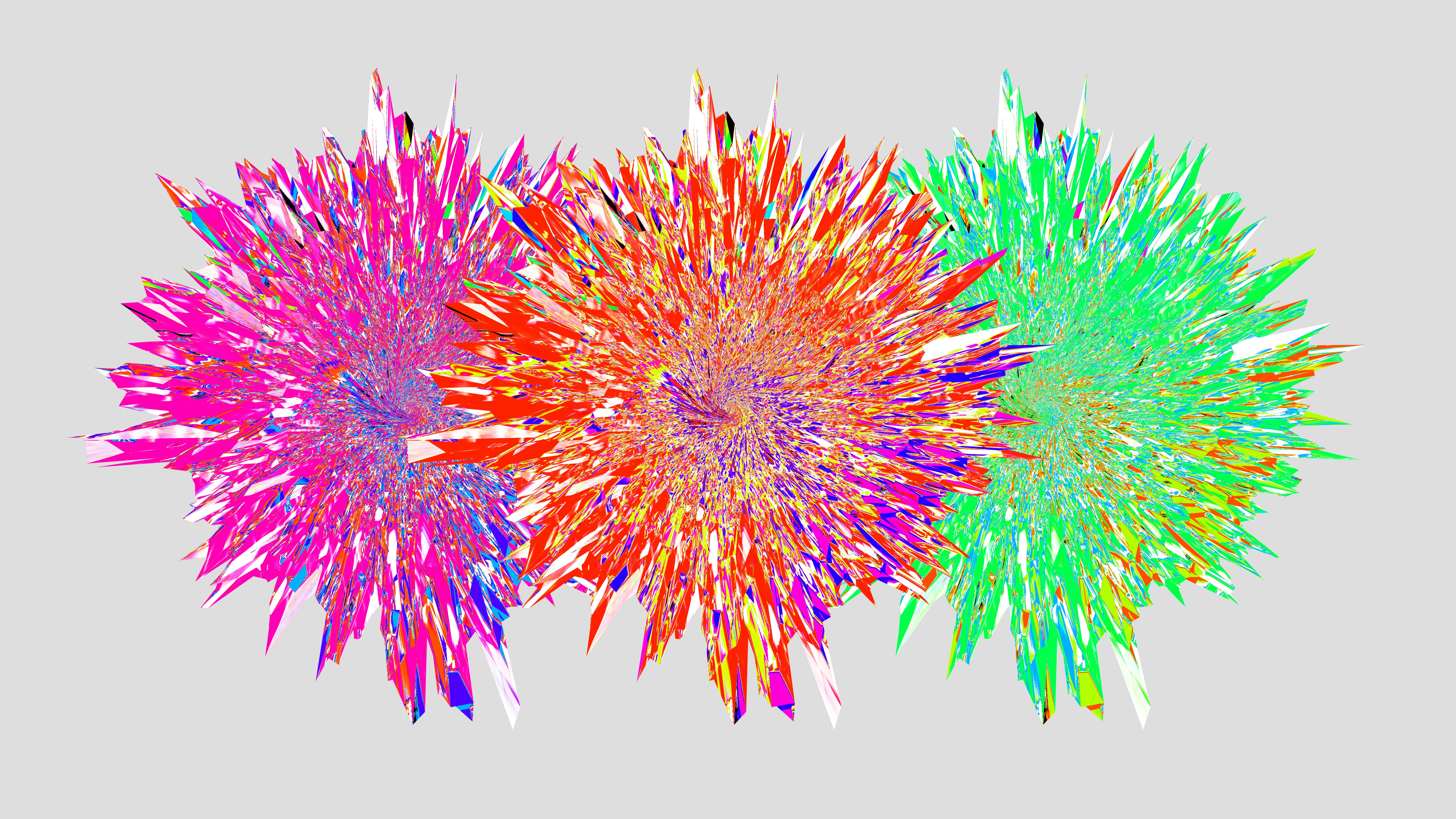 A picture of two colorful fireworks on a gray background photo – Free ...