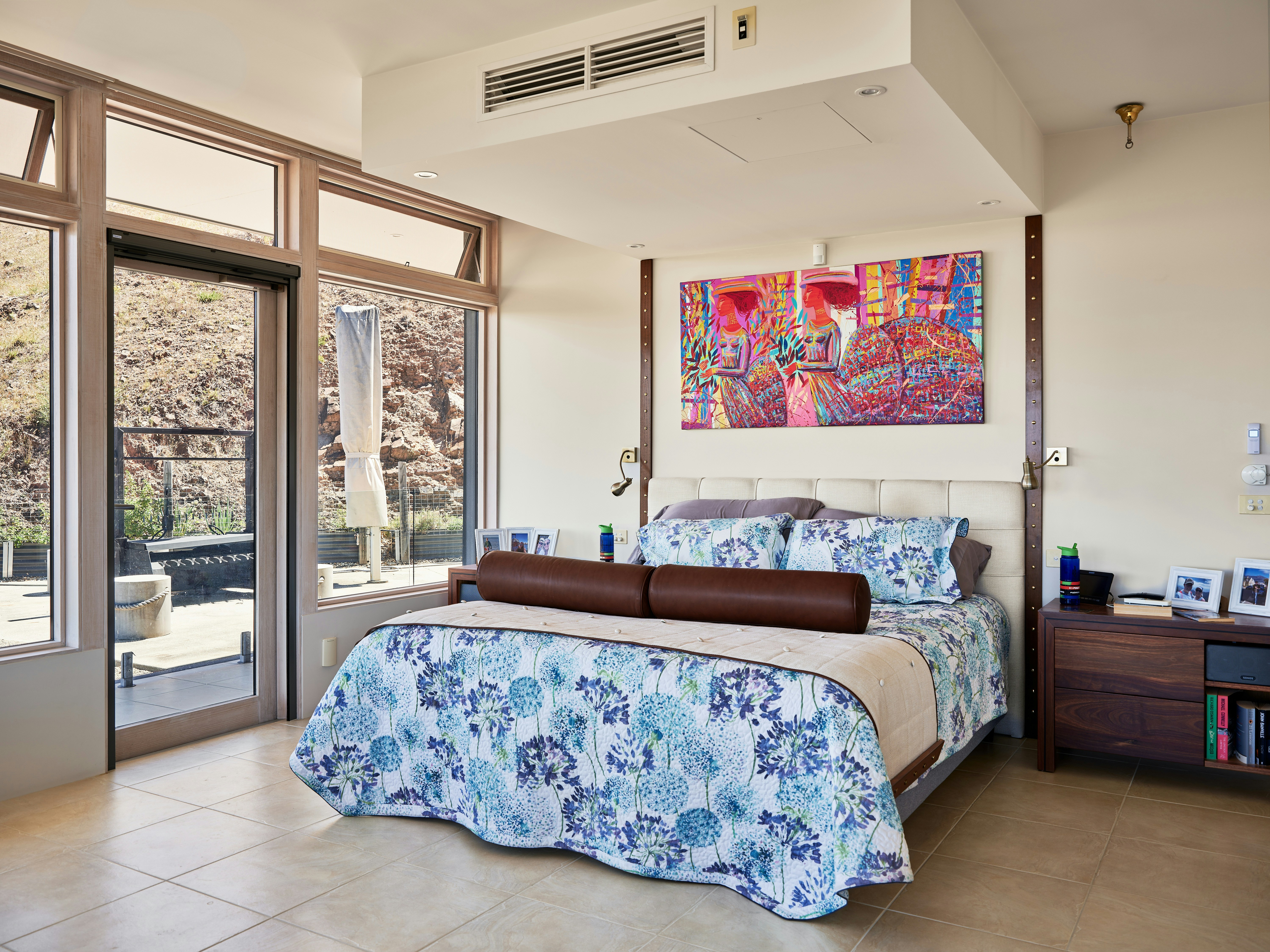 Vivid Abstract Burst Above a Tranquil Floral Bedroom