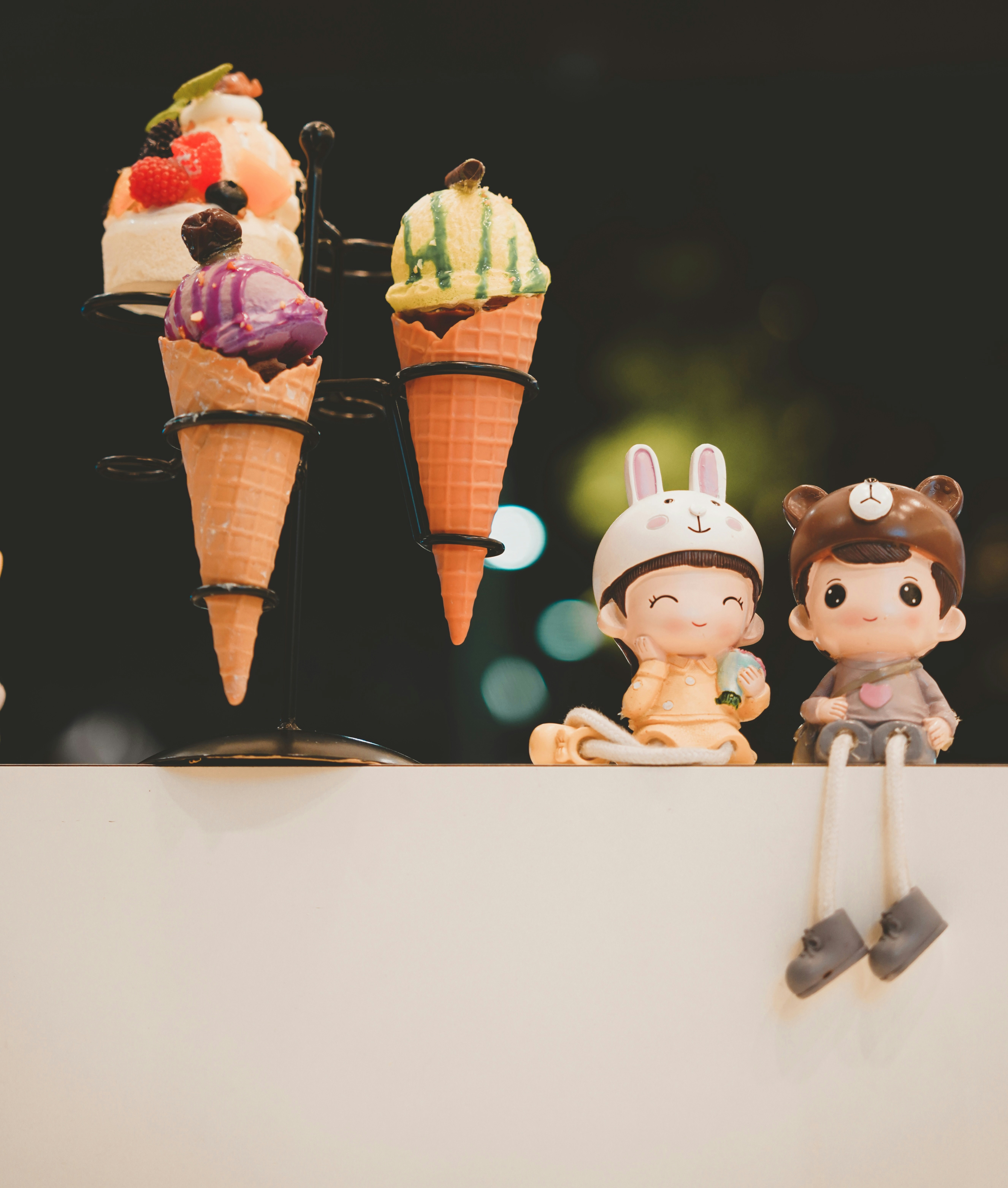 Guardians of the Cone: Ice Cream Towers and Plush Friends at Dusk