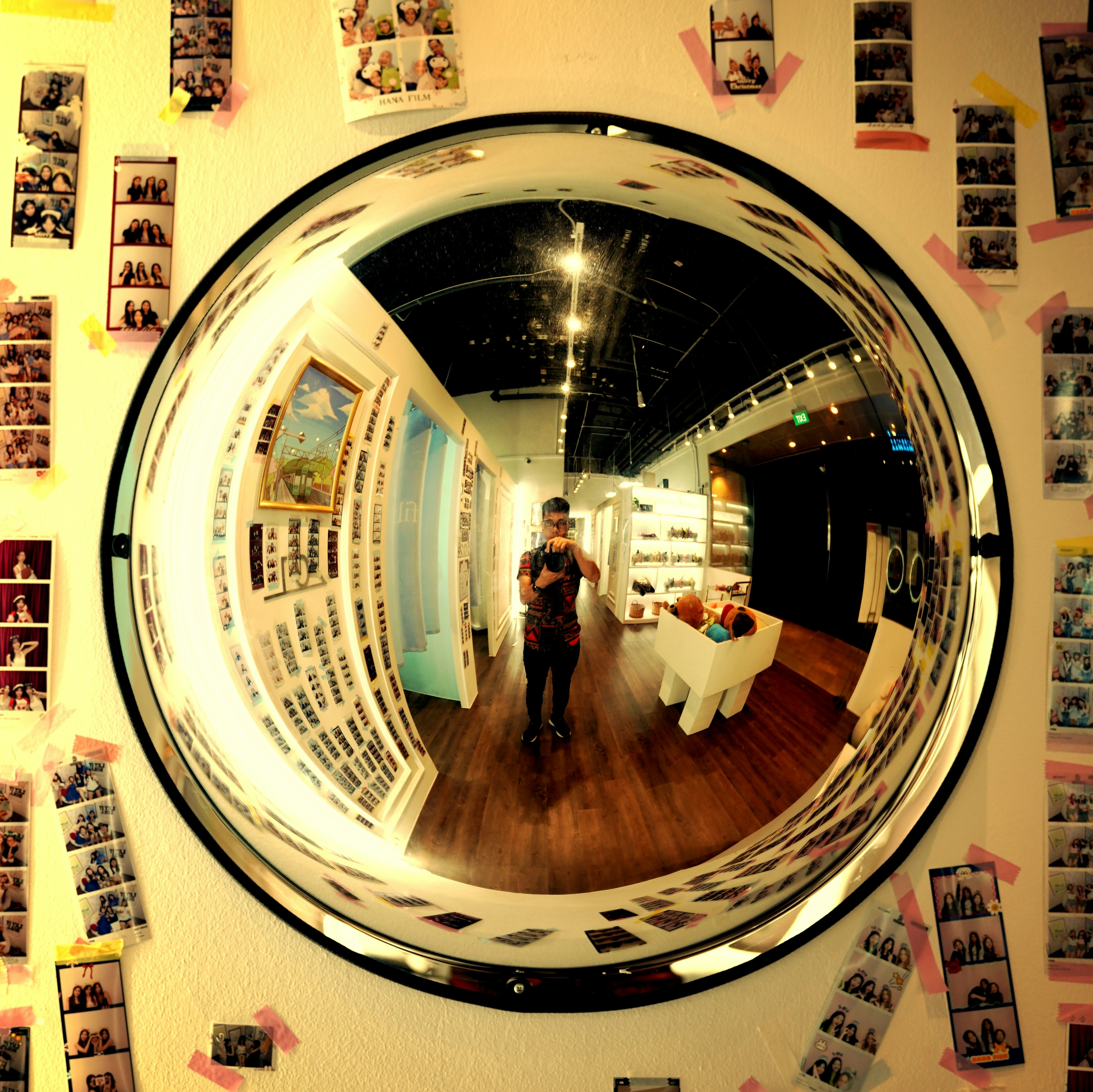 A mirror reflecting a person in a room photo – Free Portrait Image on ...