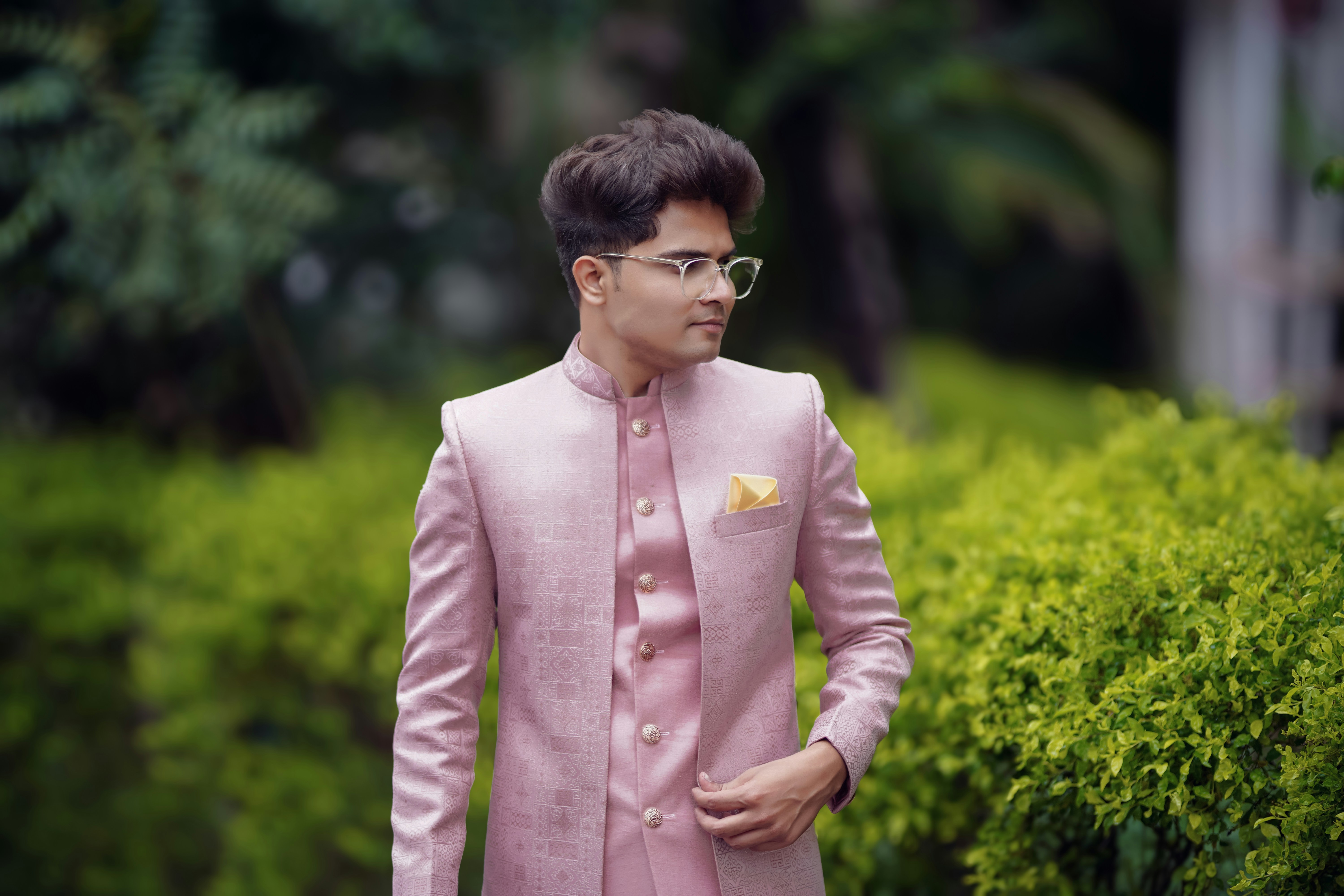 A man wearing a pink suit and glasses photo – Free Raw portrait Image ...