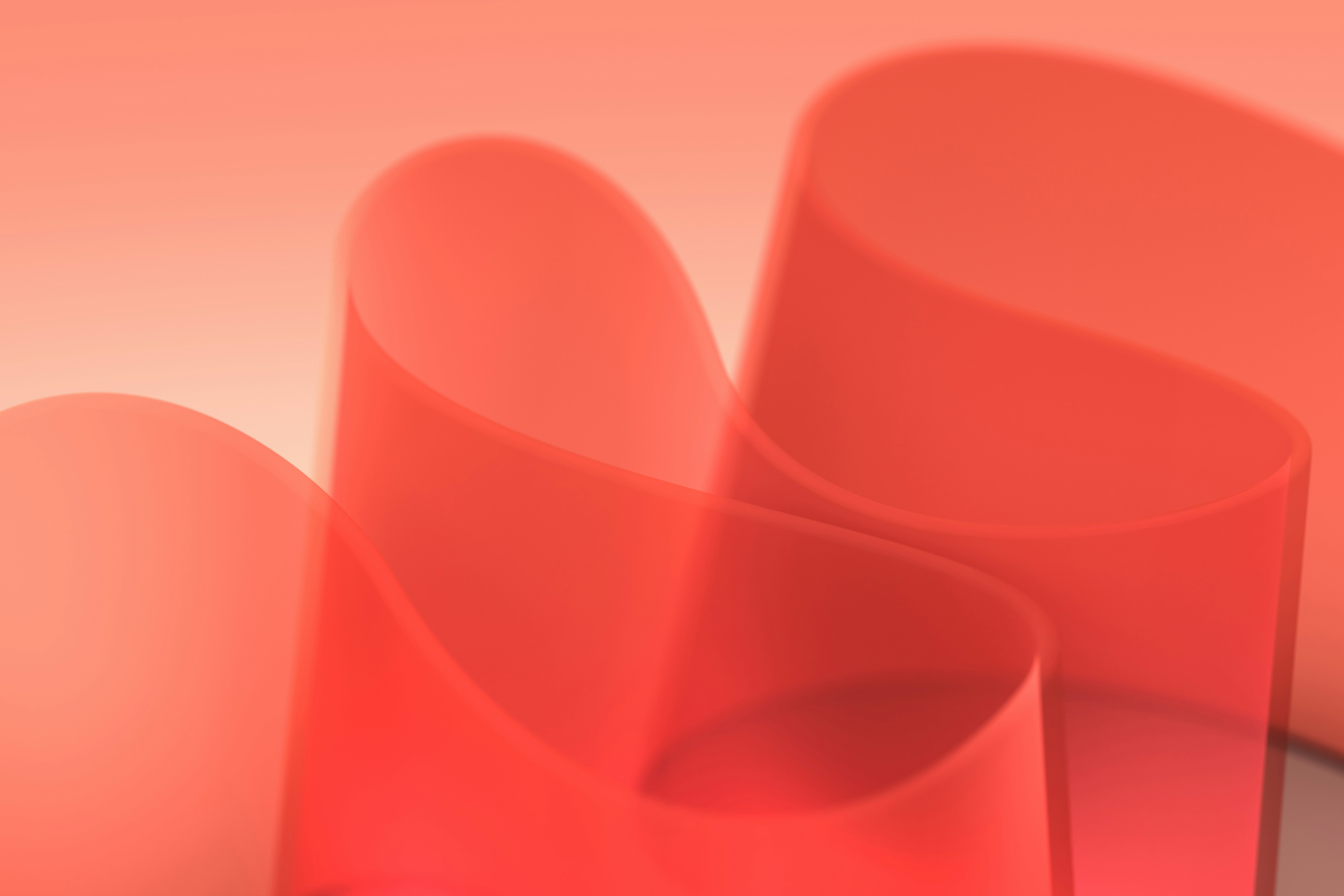 A close up of a red object with a blurry background photo – Free ...