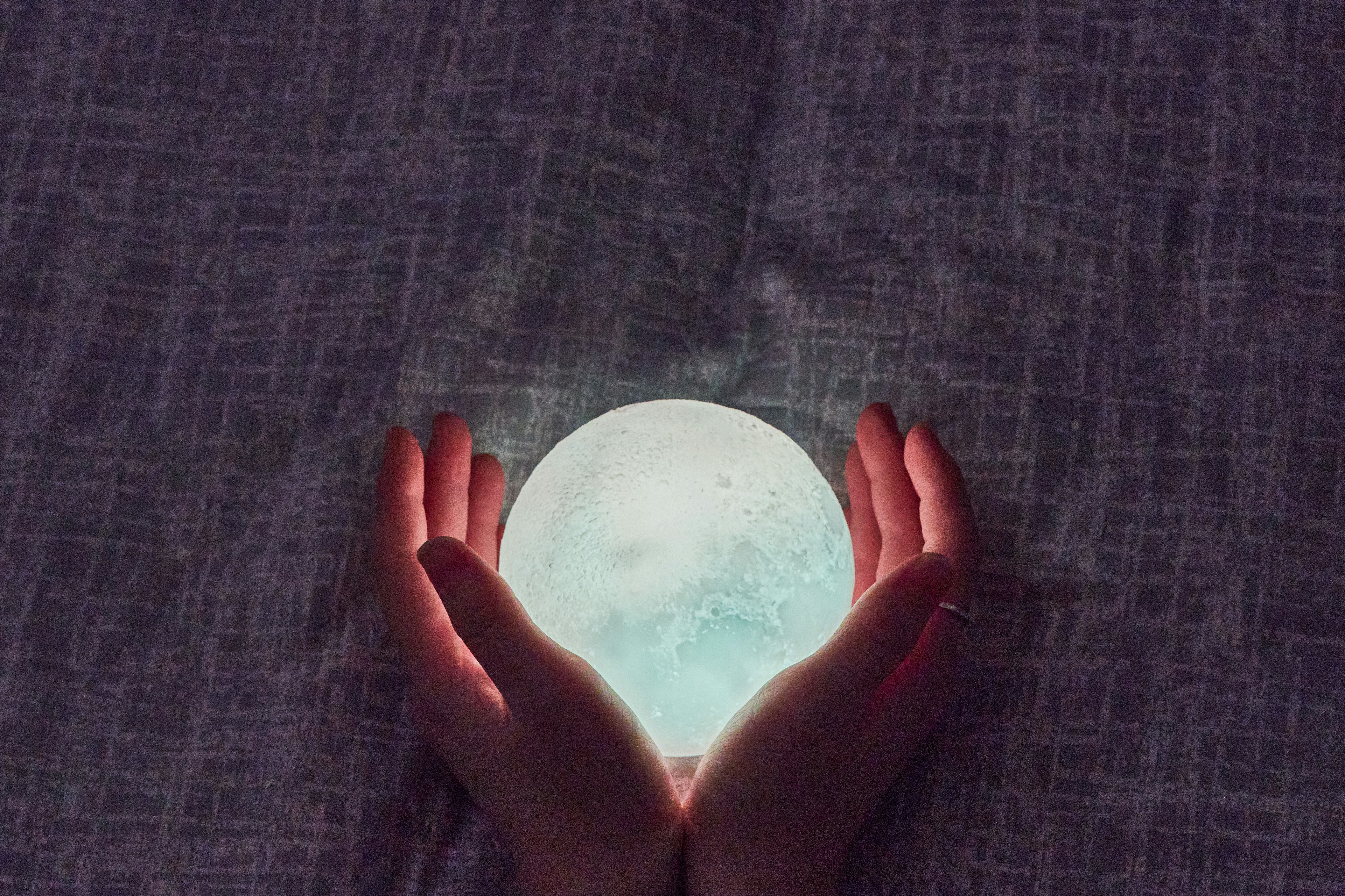 Moon in the Hands: A Gentle Radiance Cradled