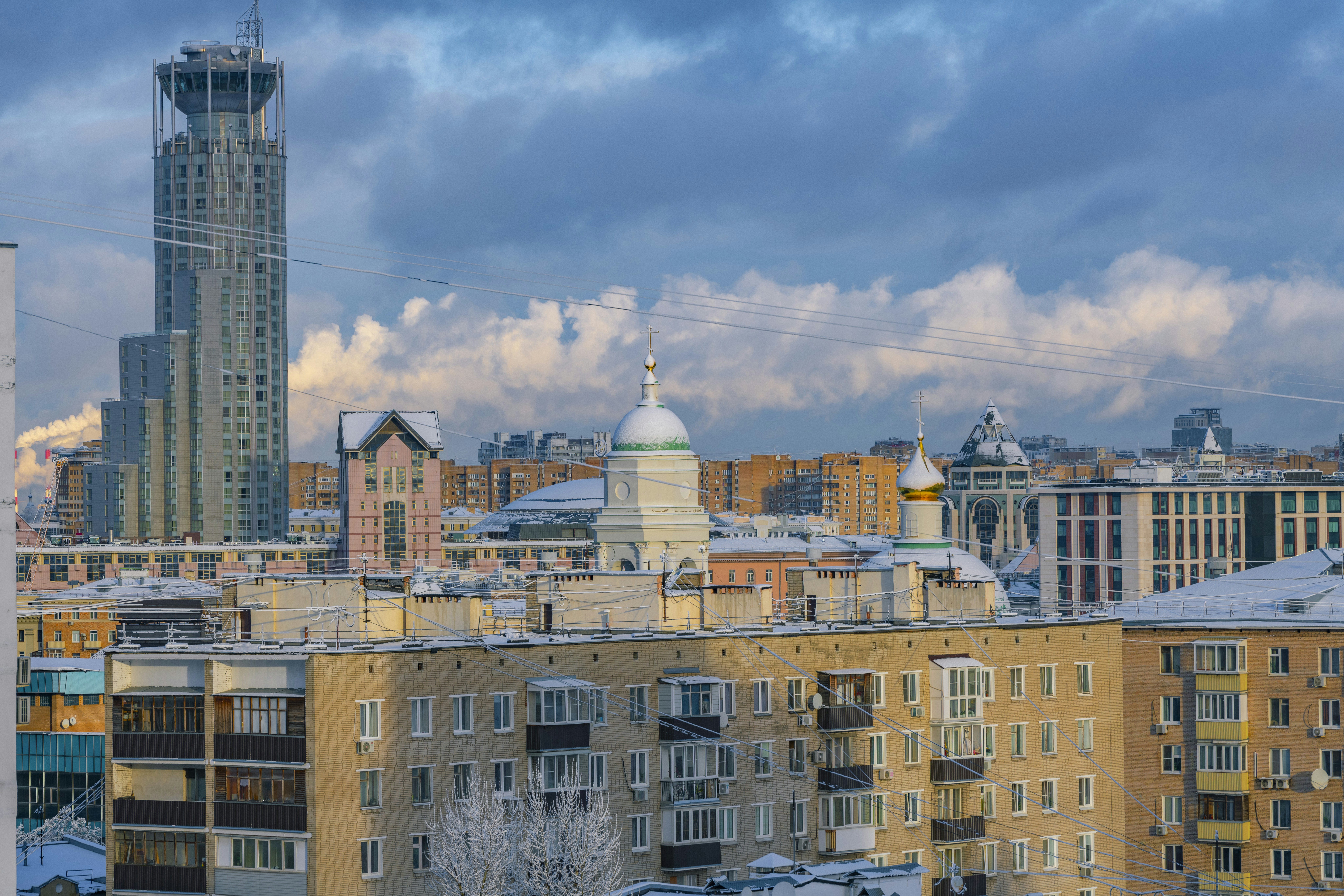 Domed Crown Over a Brick-Lined Cityscape at Winter's Edge