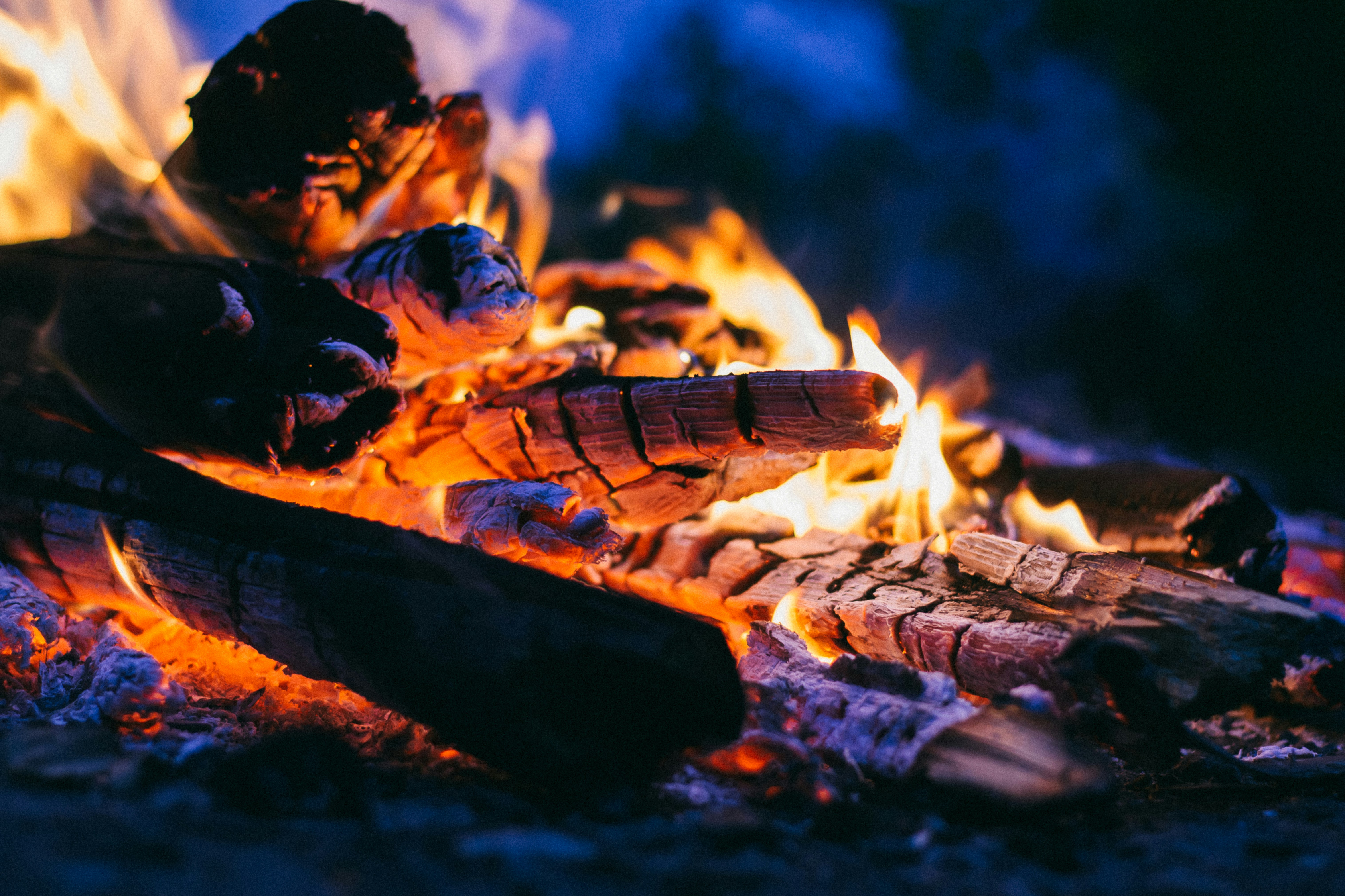 A close up of a campfire with bright flames photo – Free Fire Image on ...