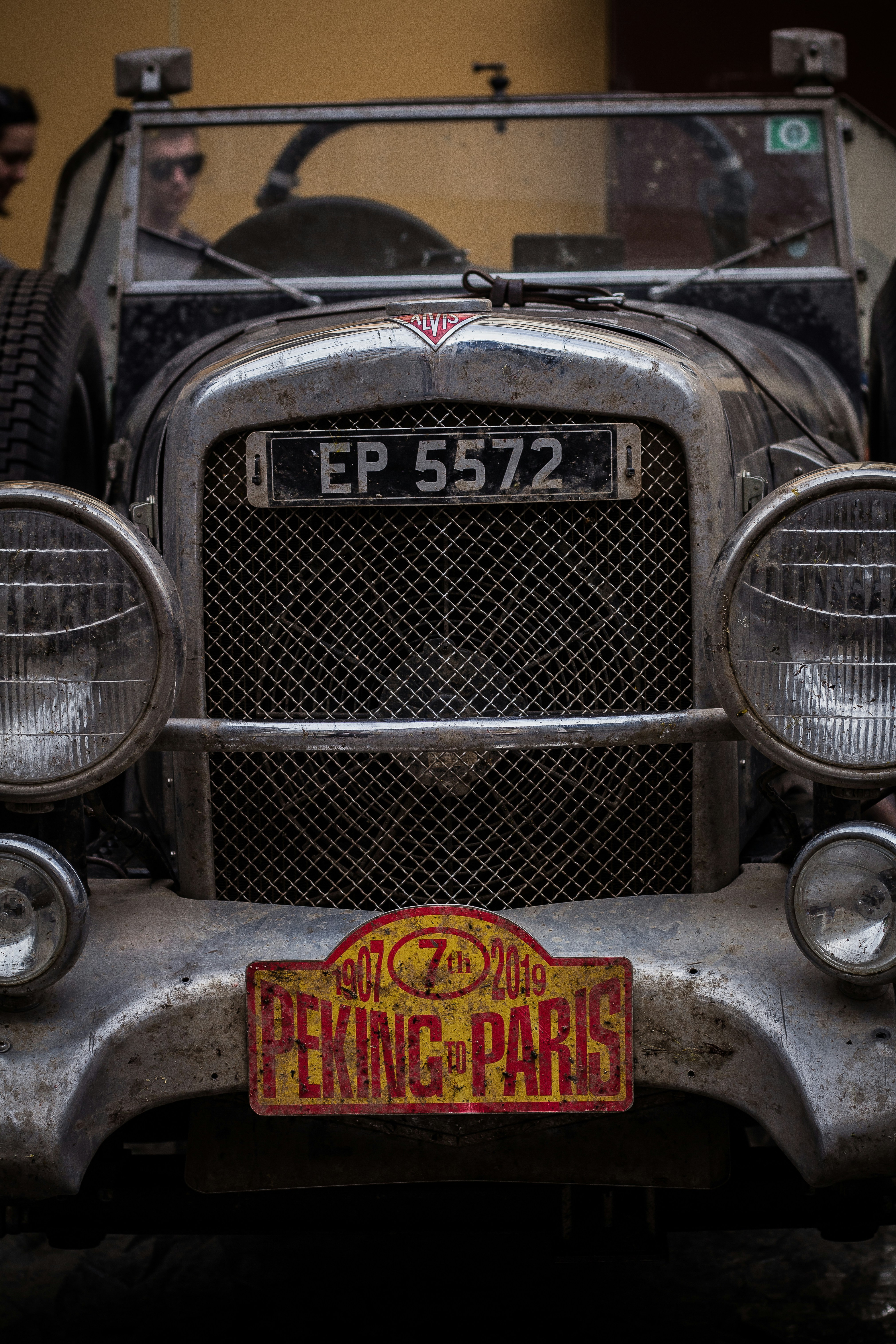 Chrome and Rust: Front View of an Antique Pekin Paris Tour Car
