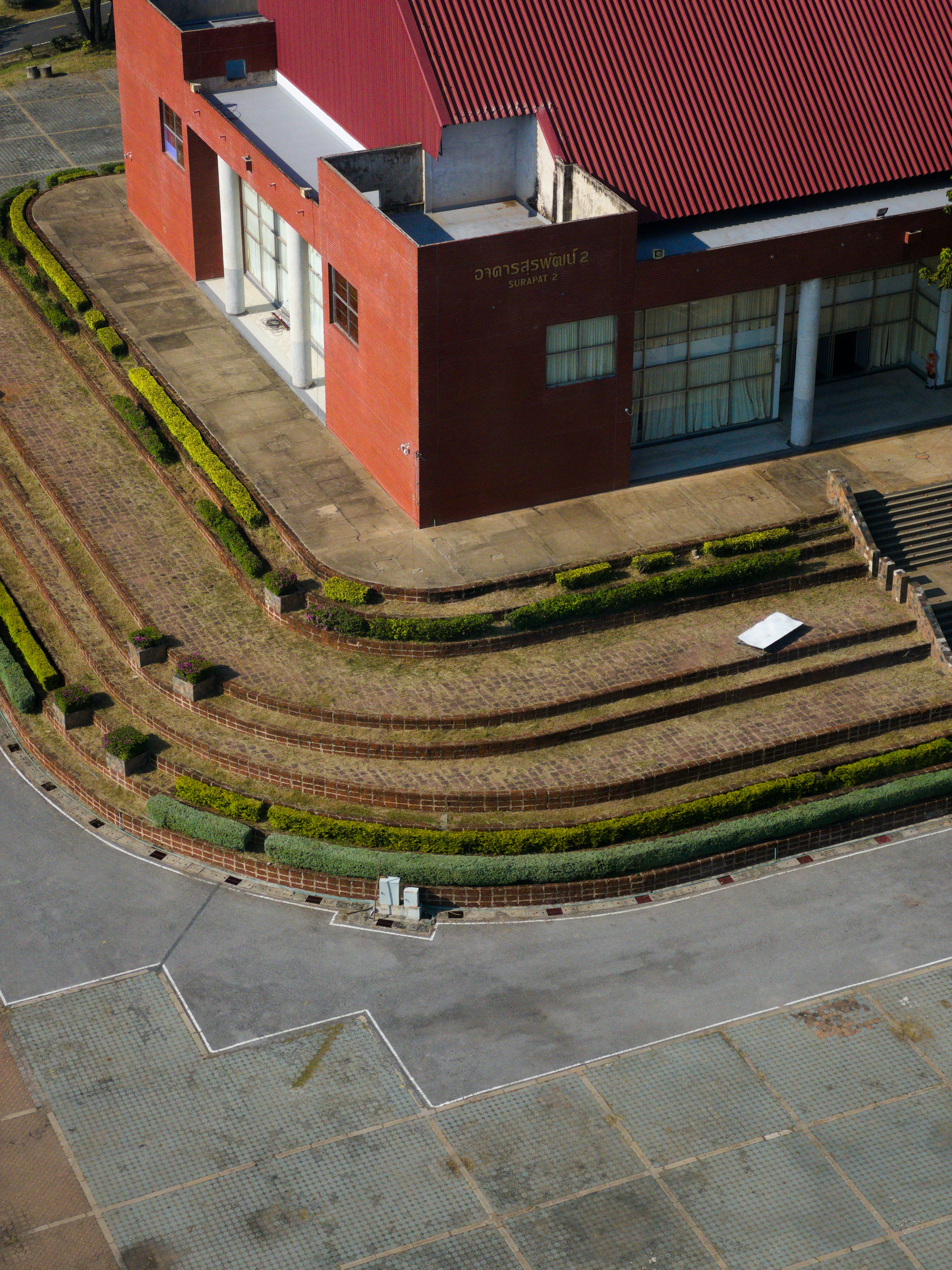 An aerial view of a building with a red roof photo – Free Nakhon ...