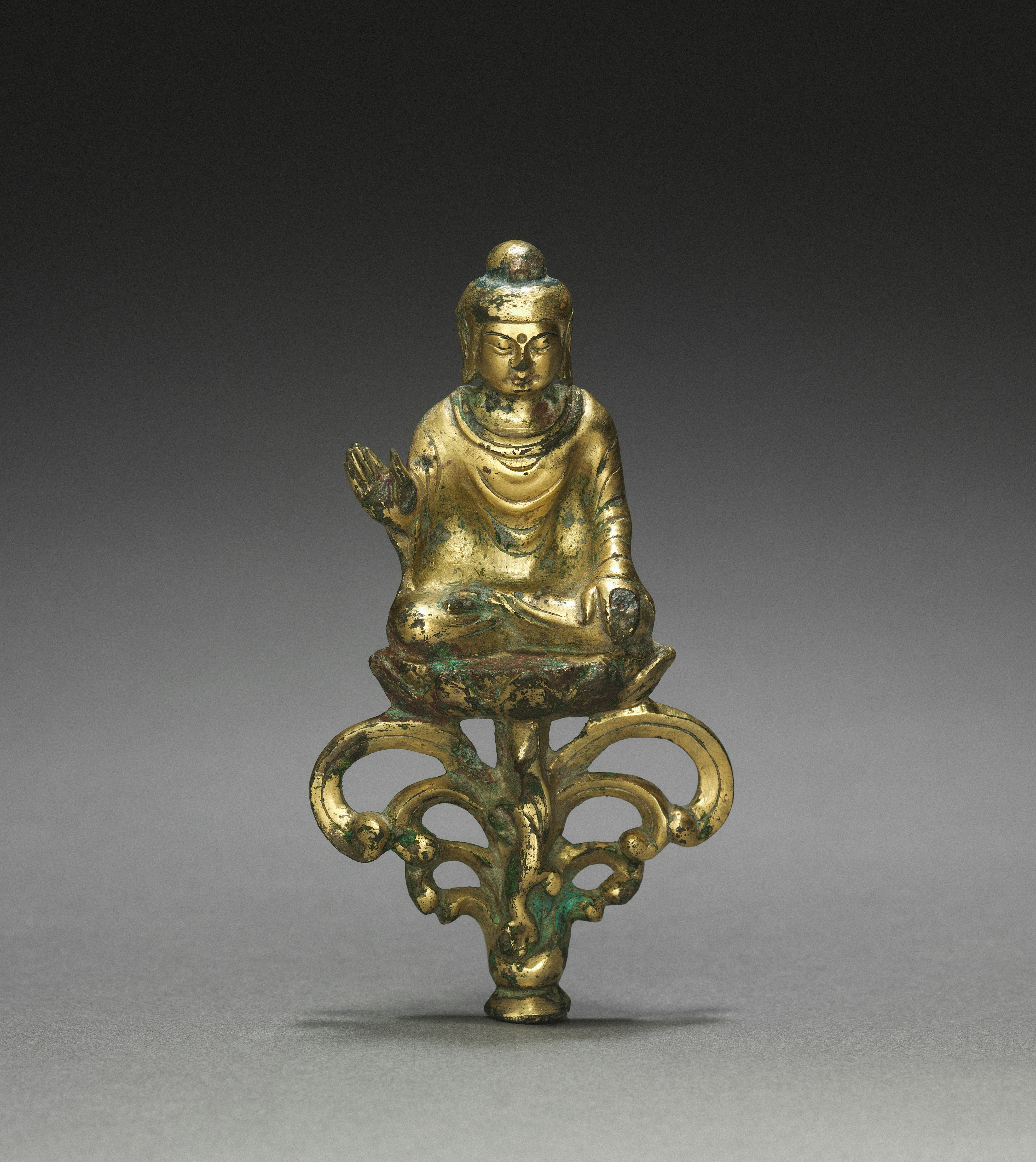 Miniature Golden Buddha Figurine on an Ornate Brass Lattice Pedestal