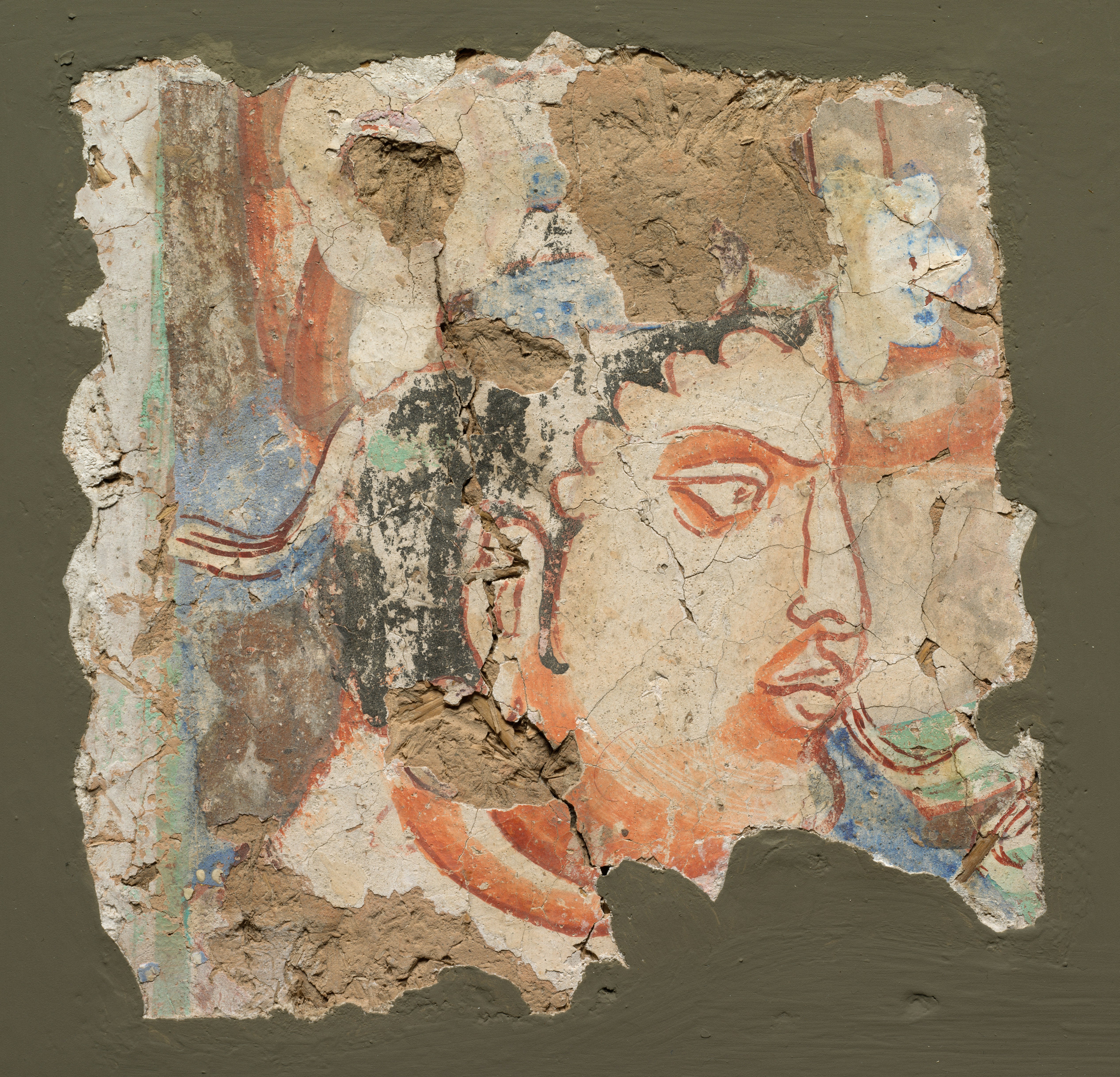 Fragment with a Head of Bodhisattva c. 600–650 Central Asia, Kizil fresco Image: 11.7 x 11.7 cm (4 5/8 x 4 5/8 in.); Overall: 15.3 x 16 cm (6 x 6 5/16 in.) John L. Severance Fund 1985.14