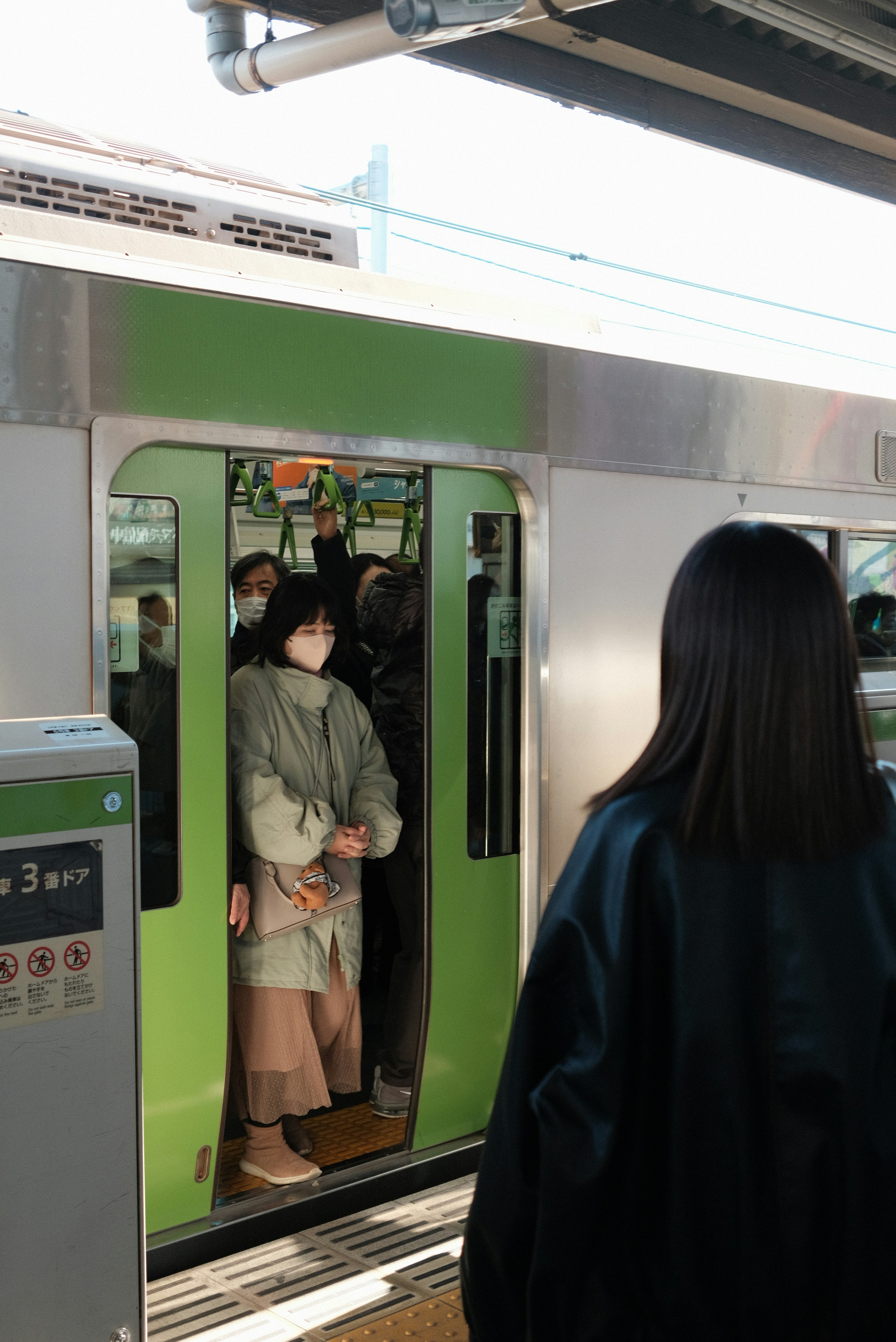 A group of people boarding a subway train photo – Free Ōkubo Image on ...