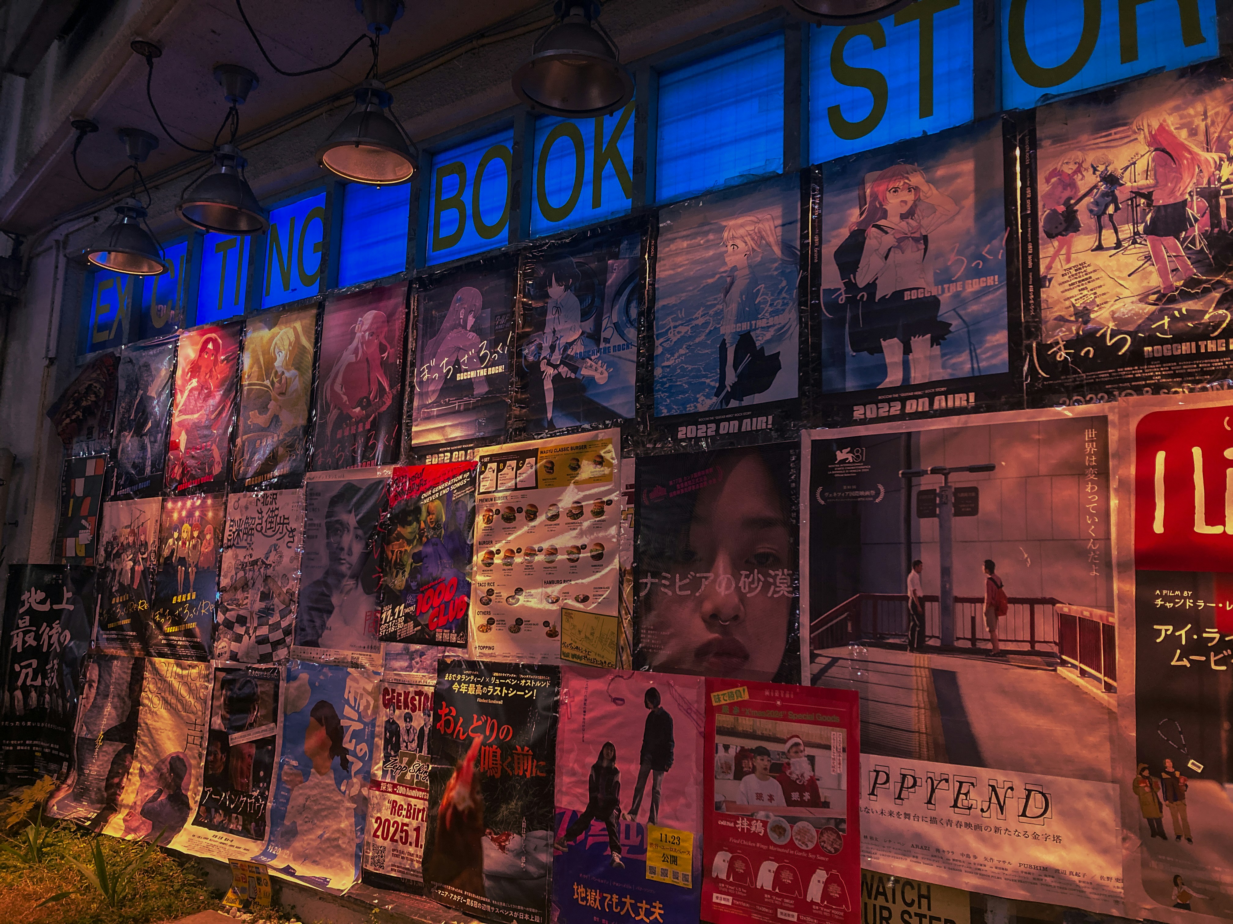 Neon Posters on a Night-Blue Gallery Wall