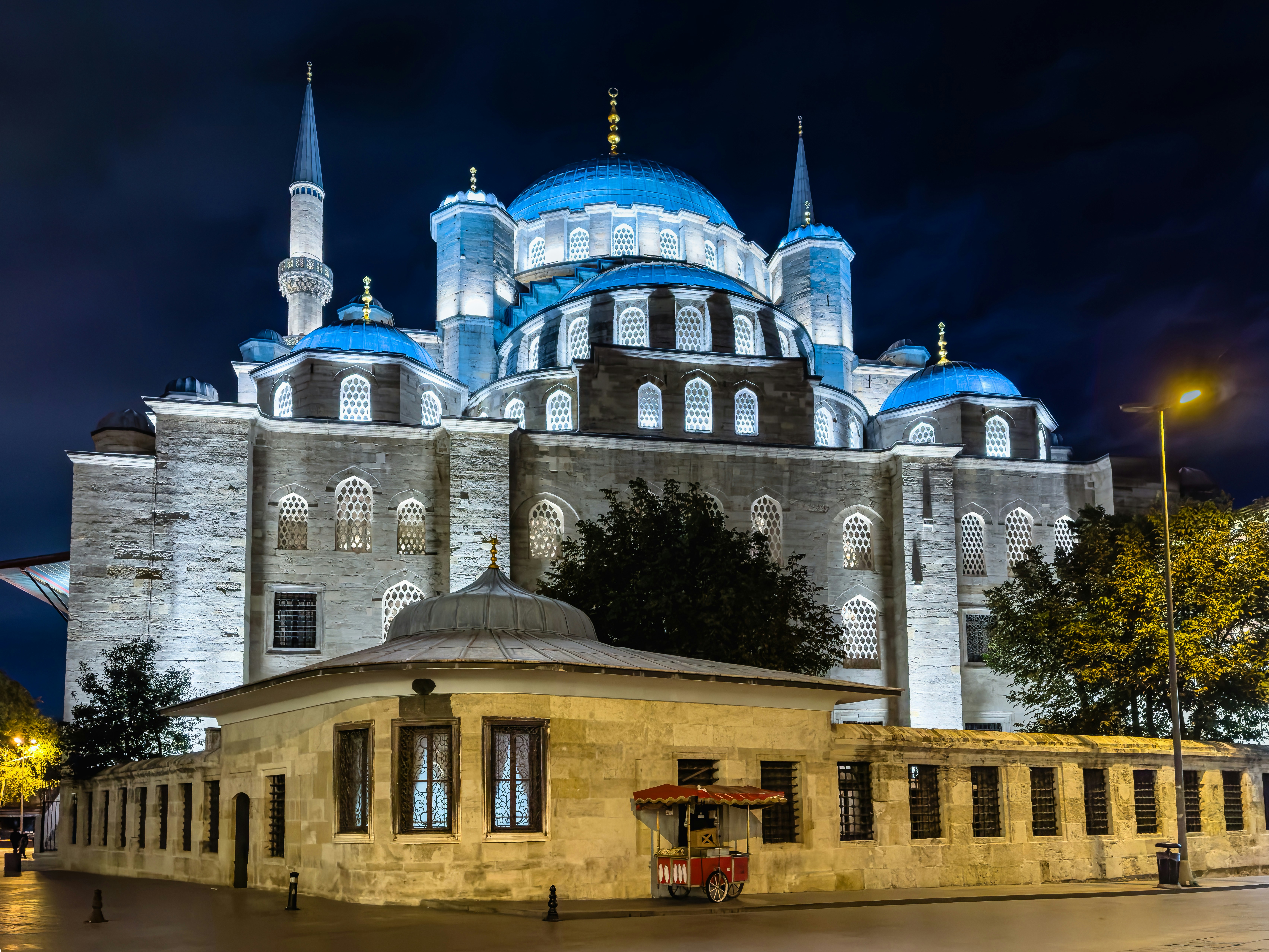 A large building with a blue dome at night photo – Free Building Image ...