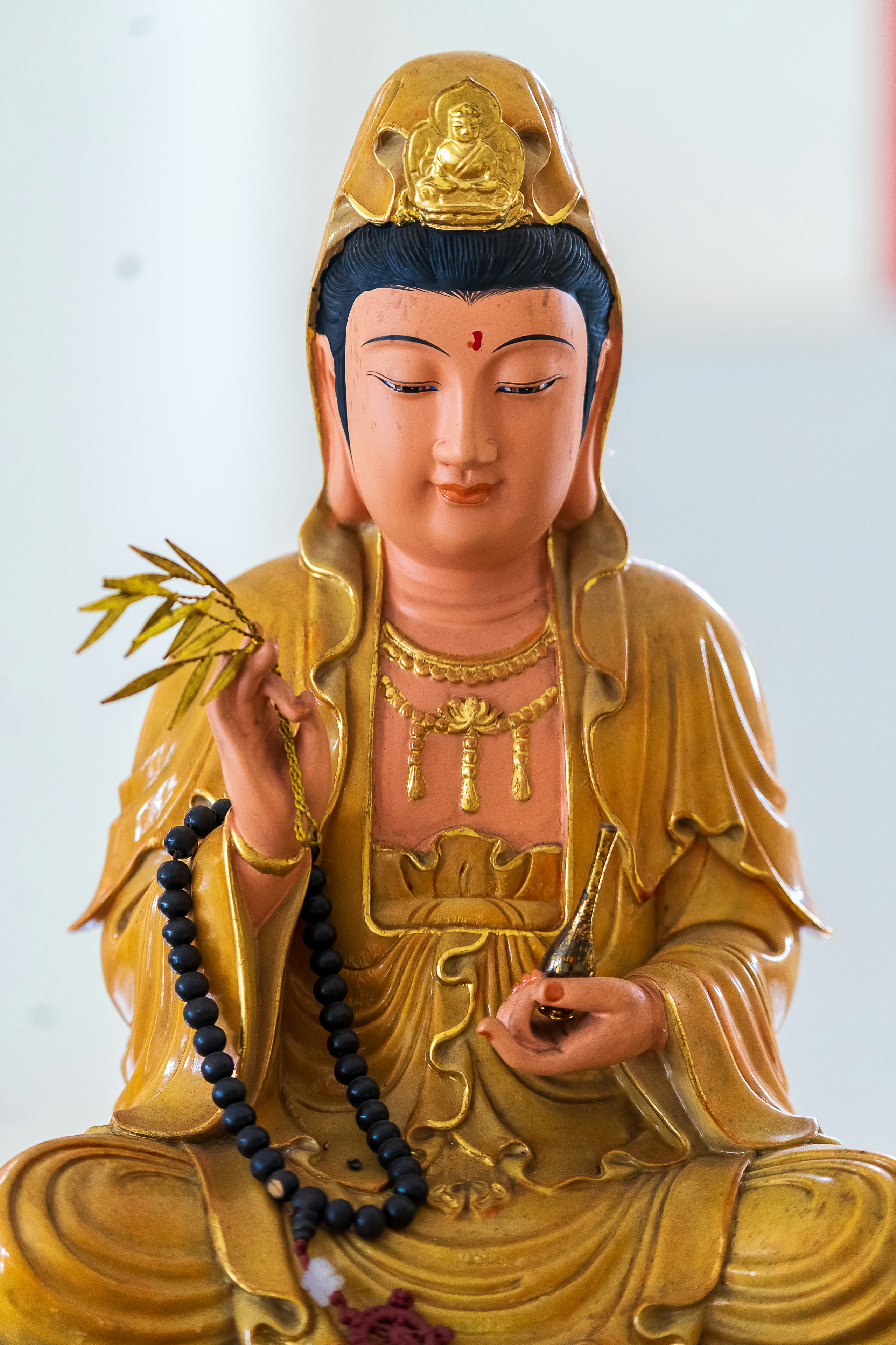A buddha statue sitting on top of a table photo – Free Surabaya Image ...
