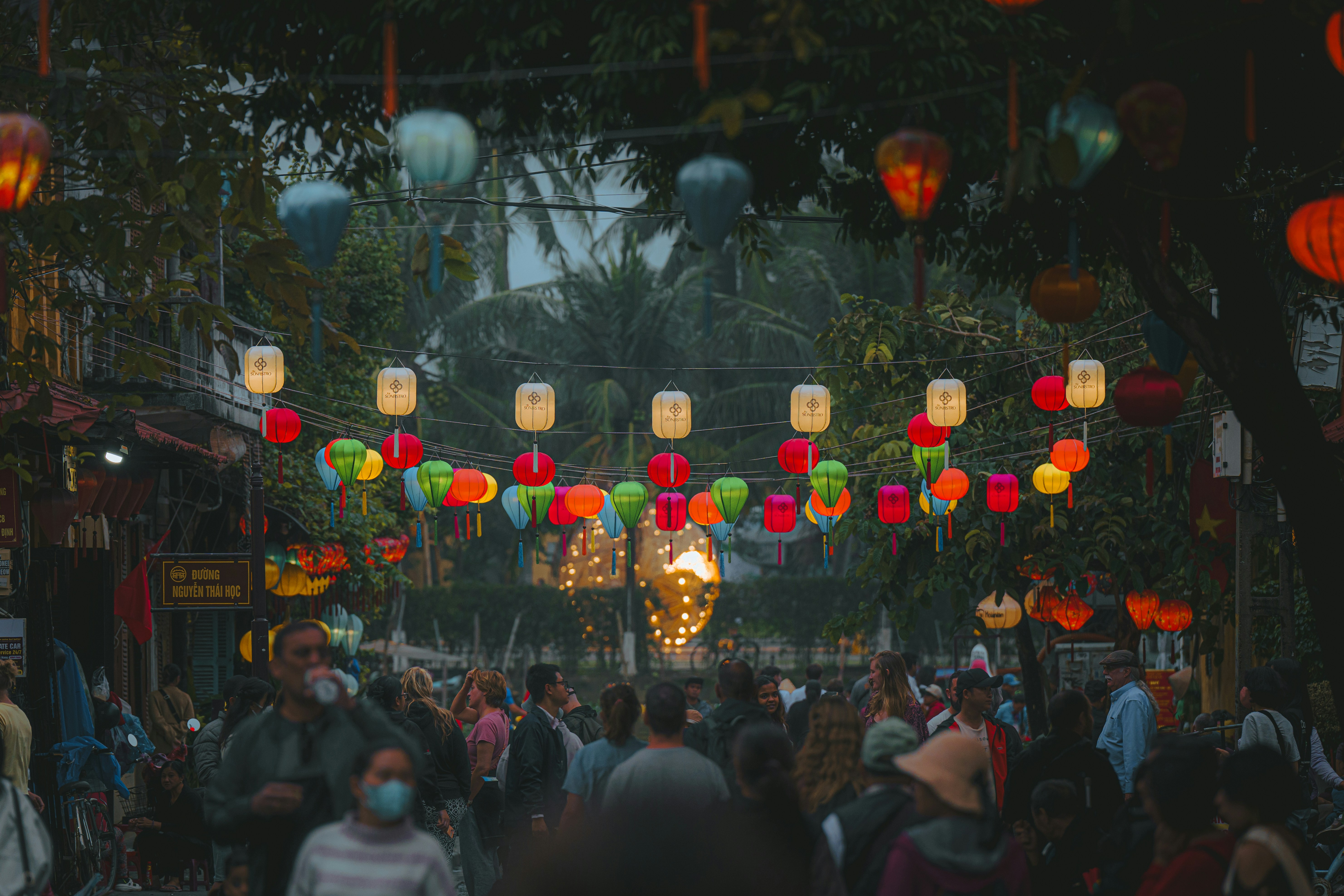 Lantern Chorus Over a Crowded Night Market