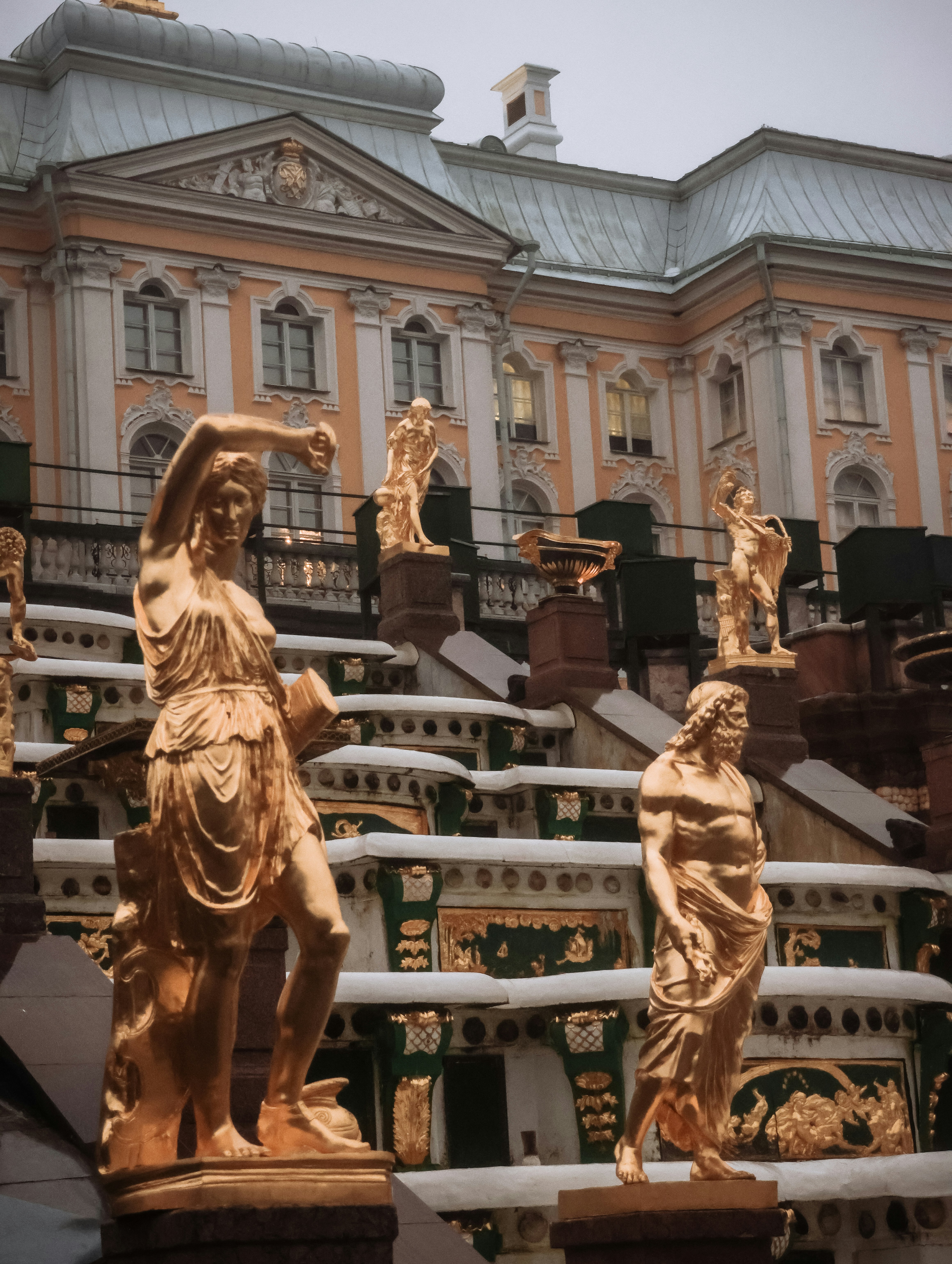 A group of statues in front of a building photo – Free Building Image ...