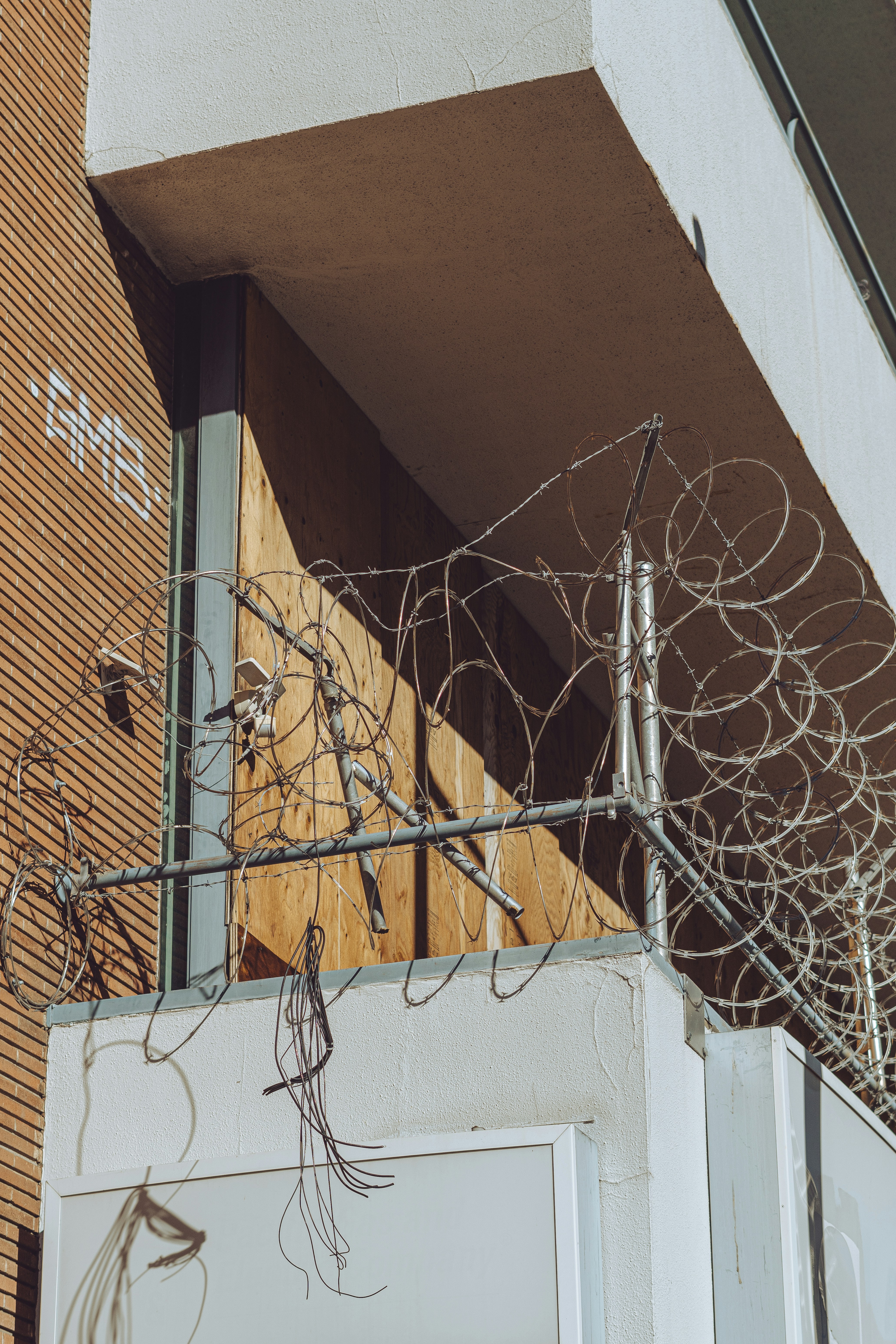 Coiled Barrier, Concrete Geometry: Urban Fortification in Focus