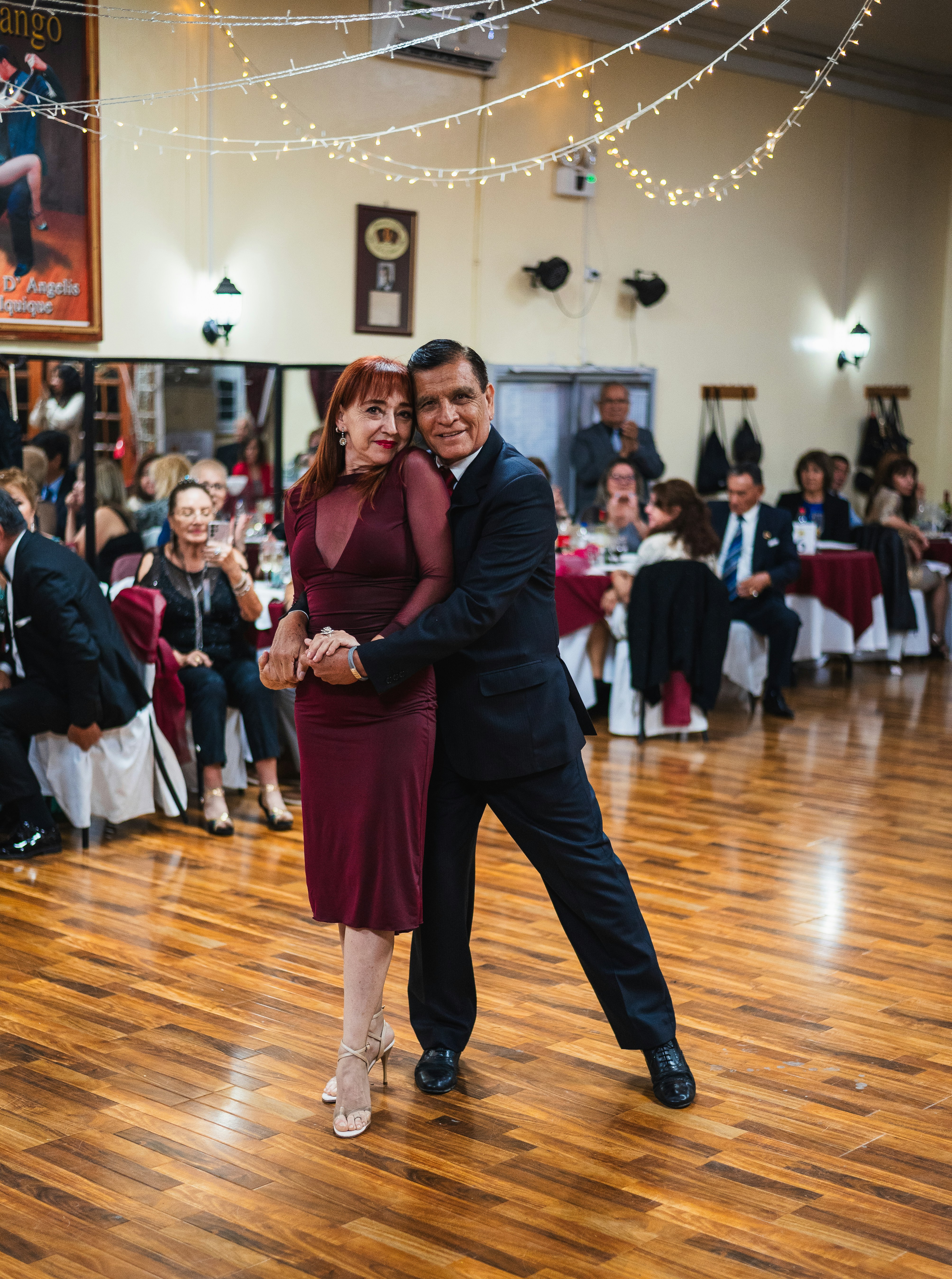 A man and a woman dancing on a dance floor photo – Free Woman Image on ...