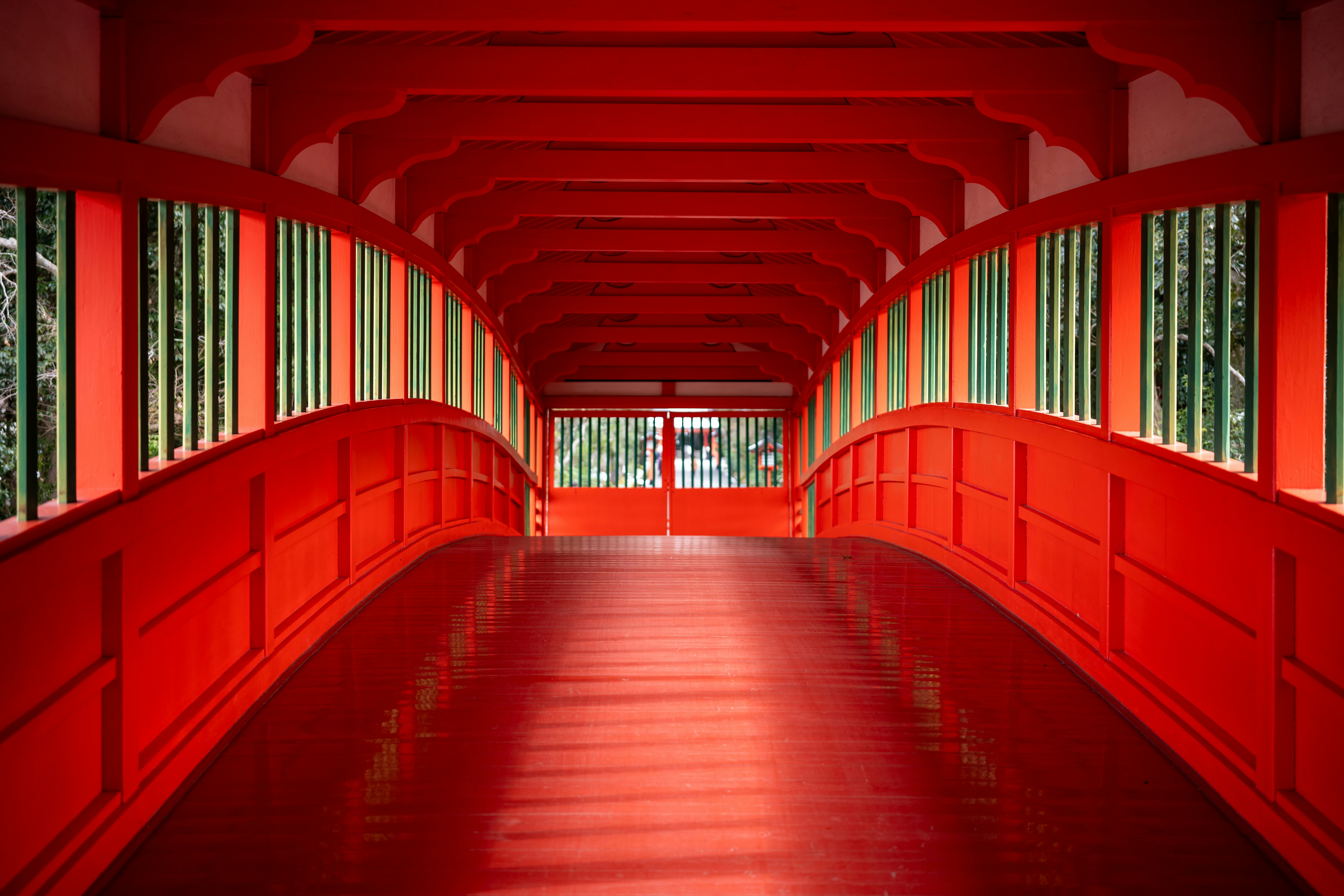 A long red bridge with a red walkway photo – Free Building Image on ...