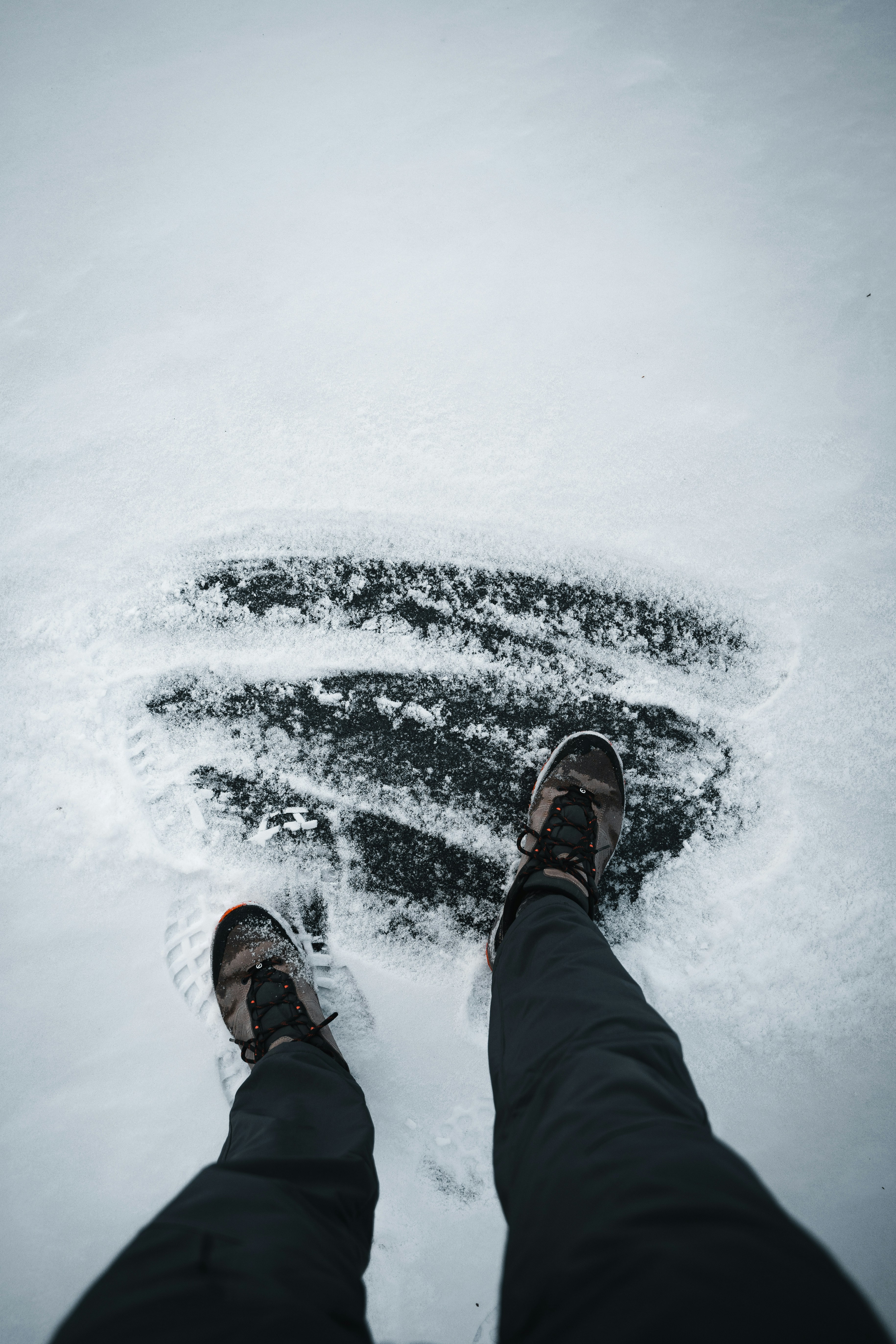 Circles in the Snow: Footstep Echoes Beneath a Hiker's Boots