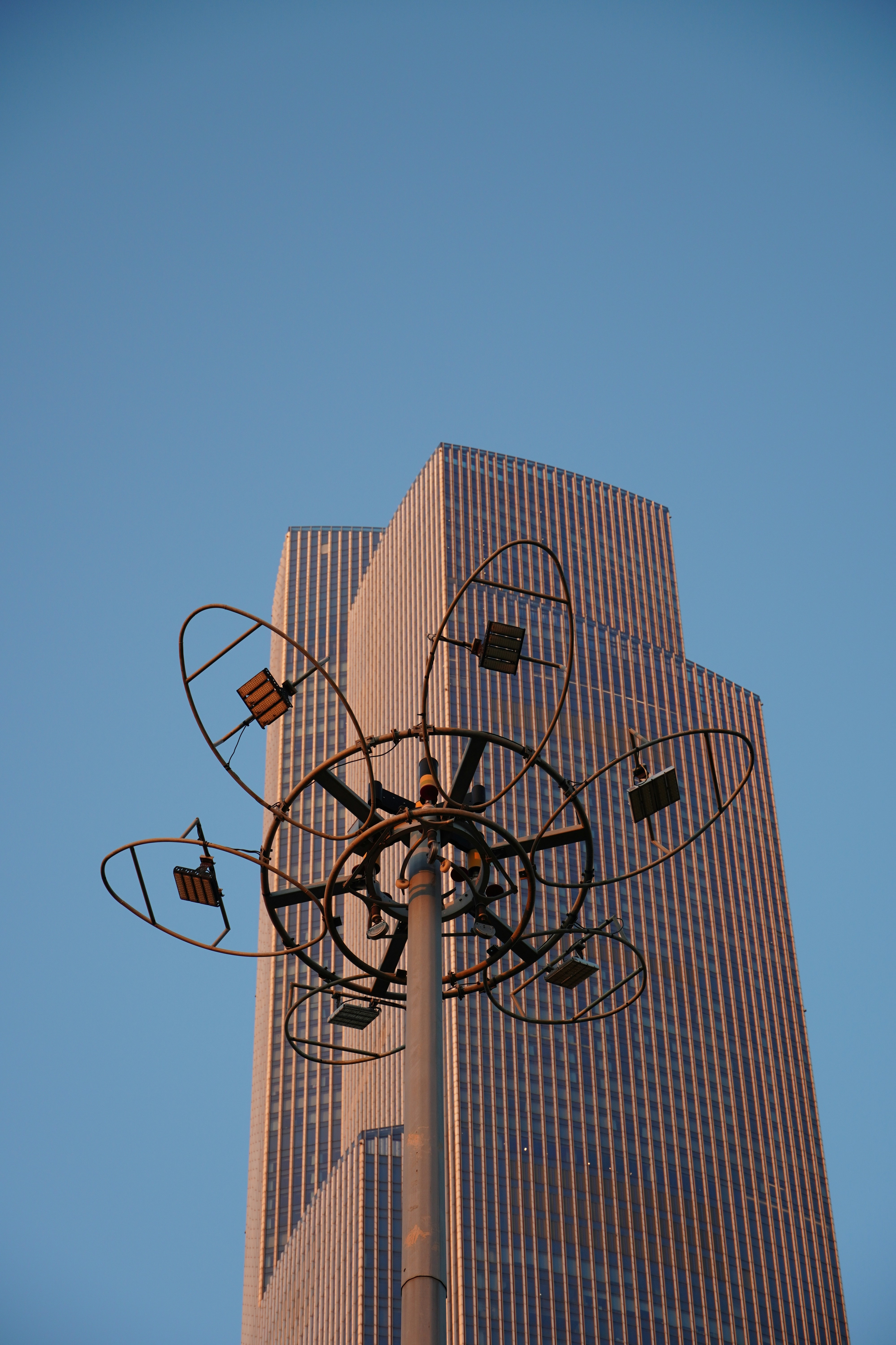 Orbiting Rings Against a Glassy Skyline