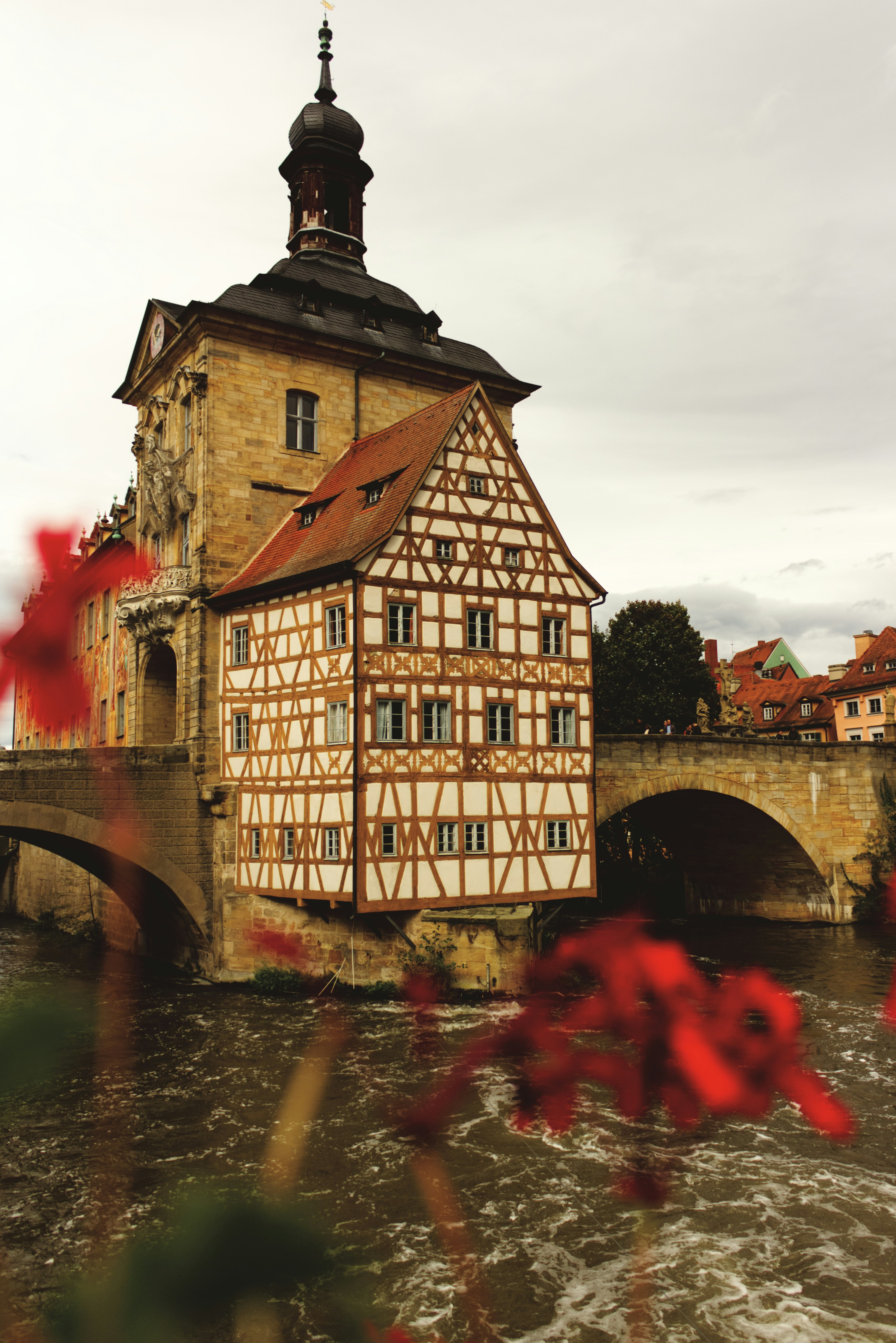 A building on a bridge over a body of water photo – Free Bamberg Image ...