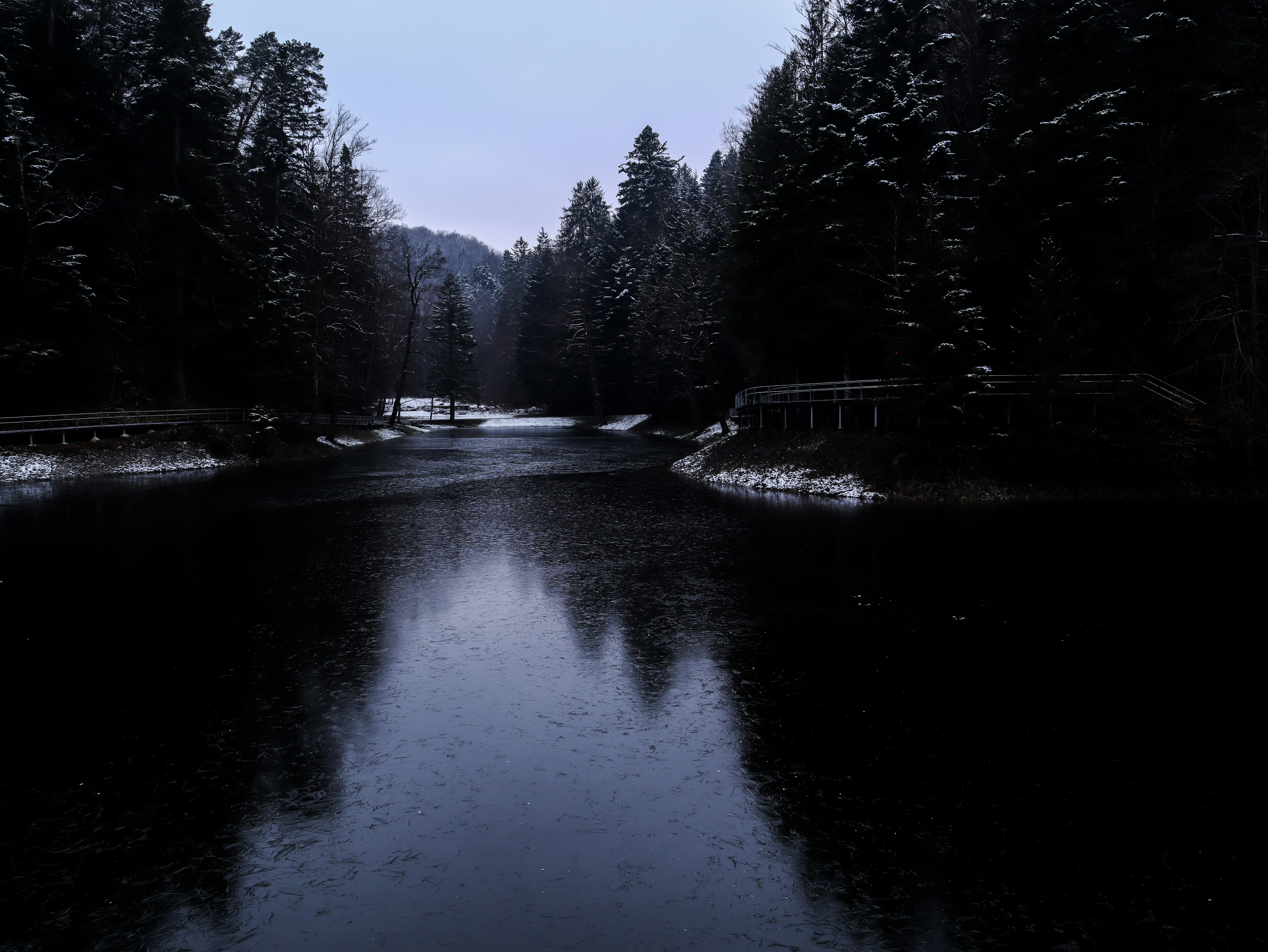 Twilight Drift Along a Snow-Dusted River