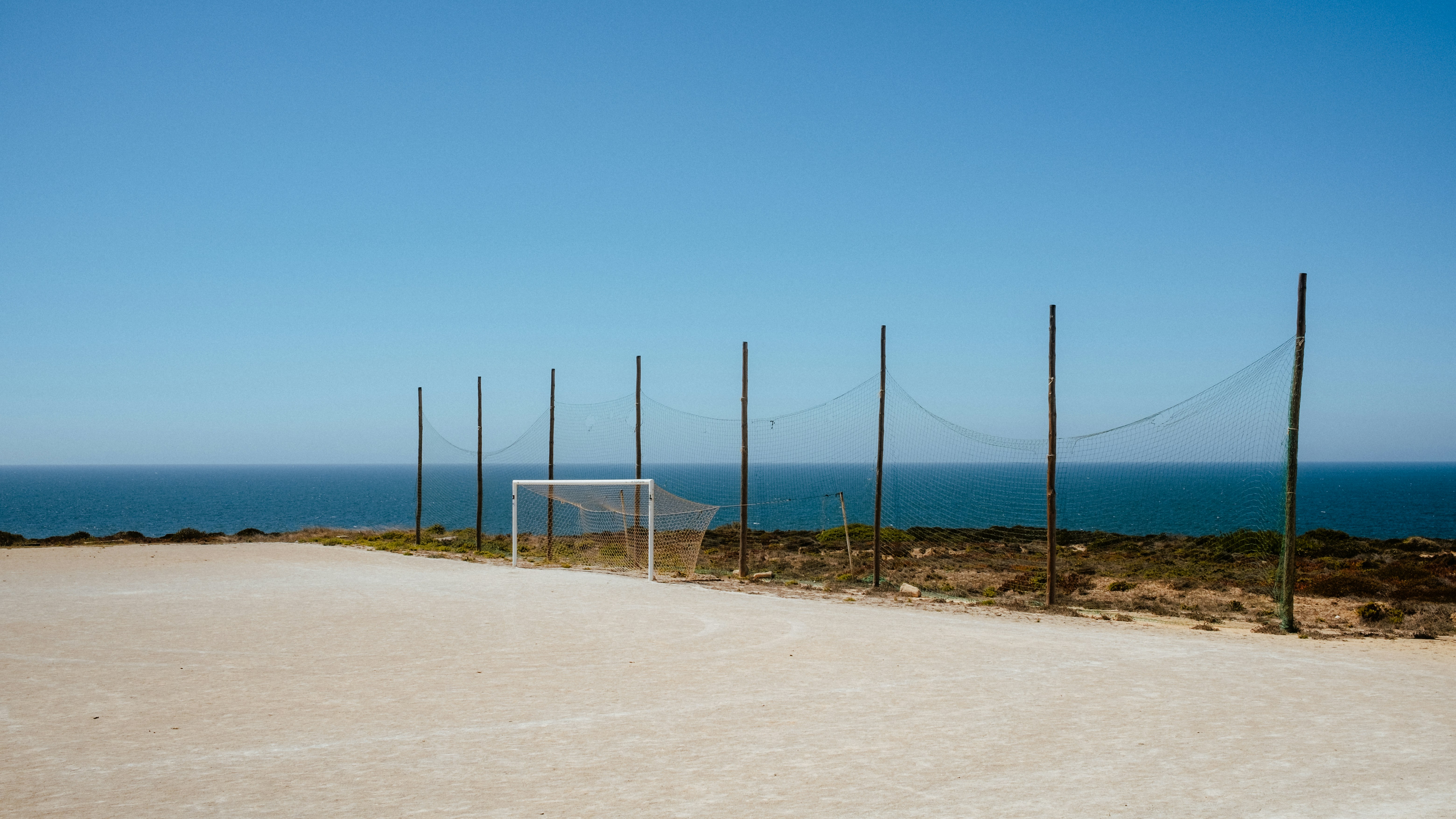 Windward Net: A Minimalist Beach Soccer Scene
