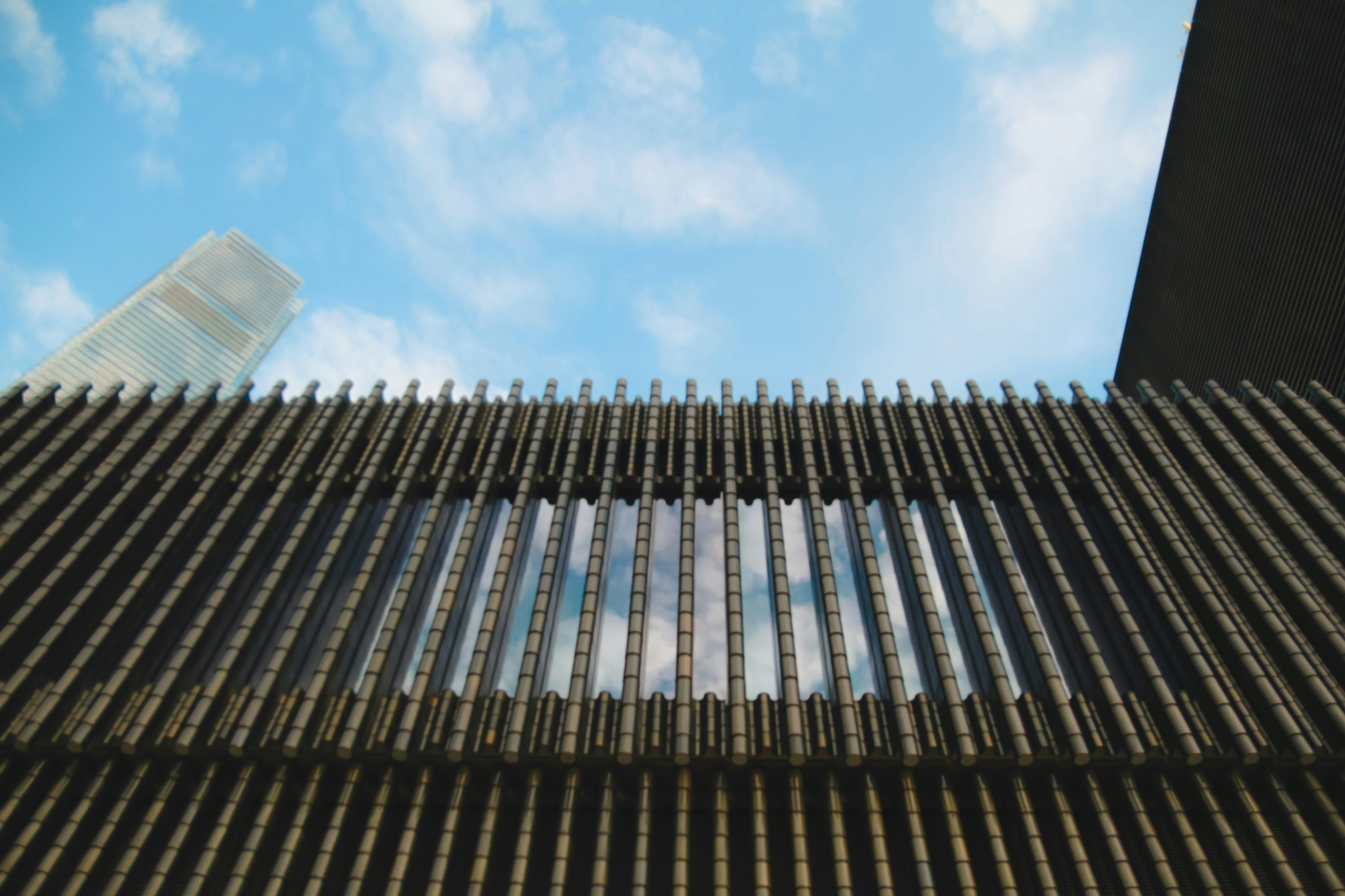 A very tall building with a sky in the background photo – Free Building ...