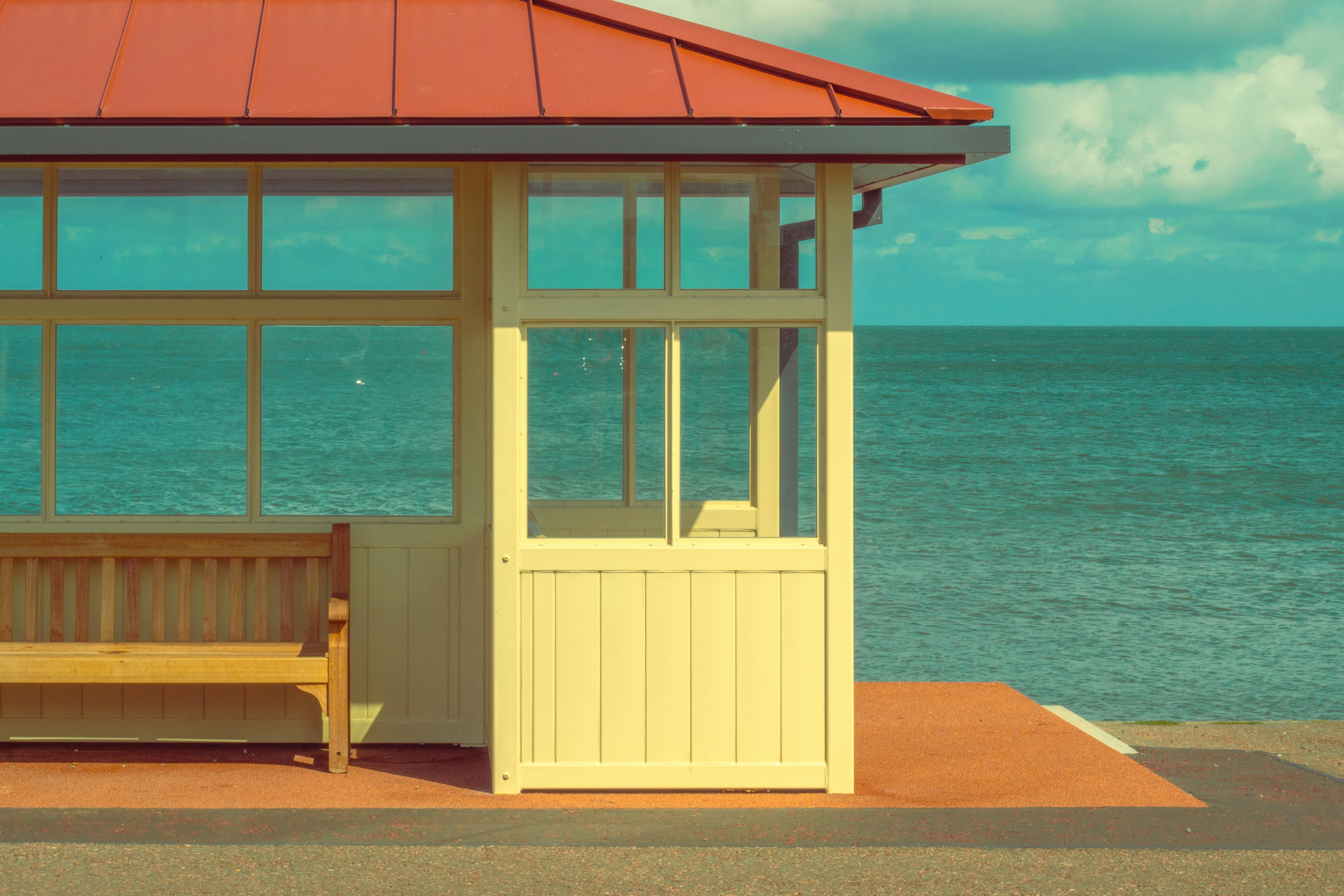 Seaside Yellow Kiosk Framed by Turquoise Waters