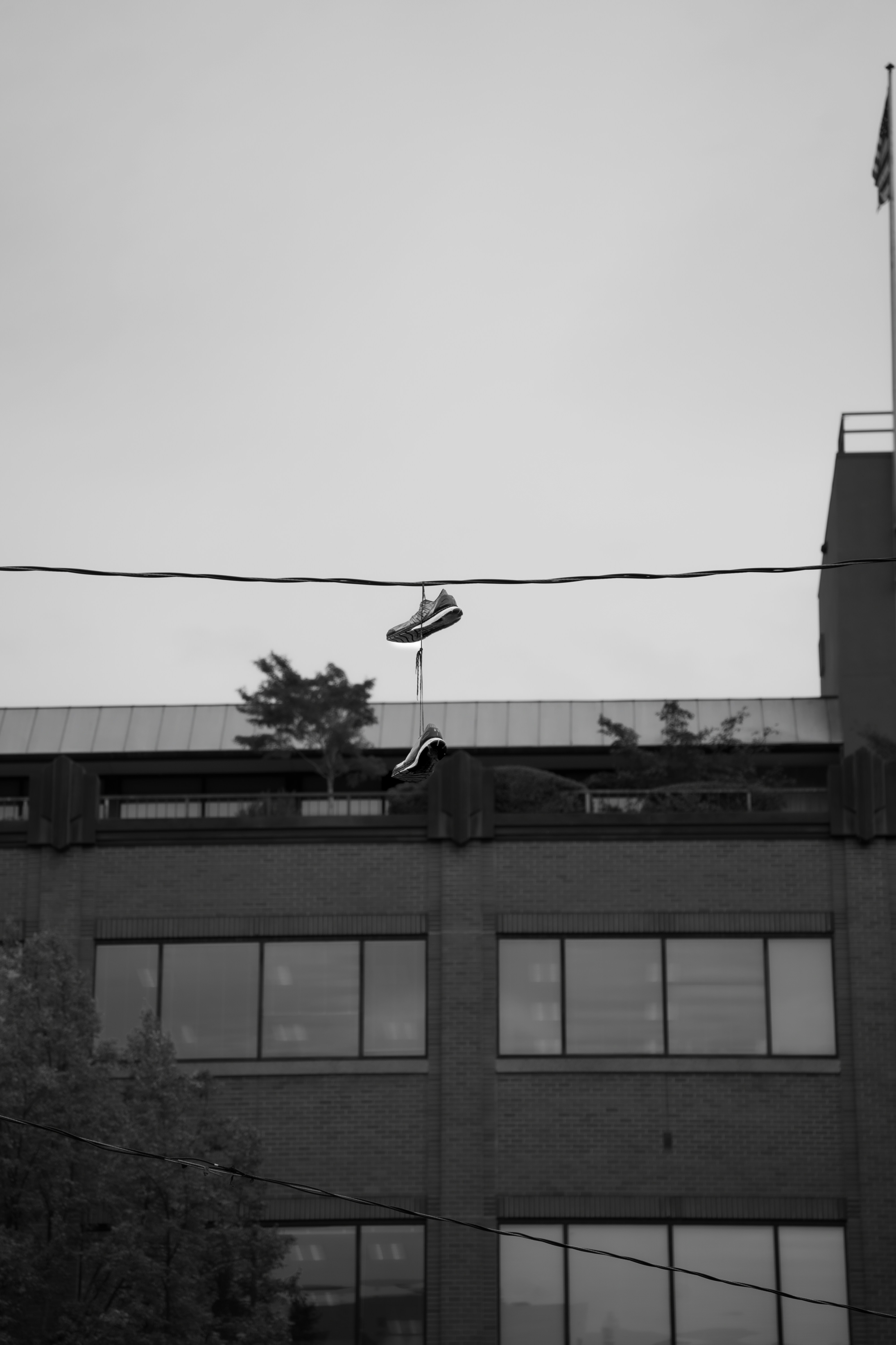 Suspended Feet: A Minimal Moment Above the Urban Roofline