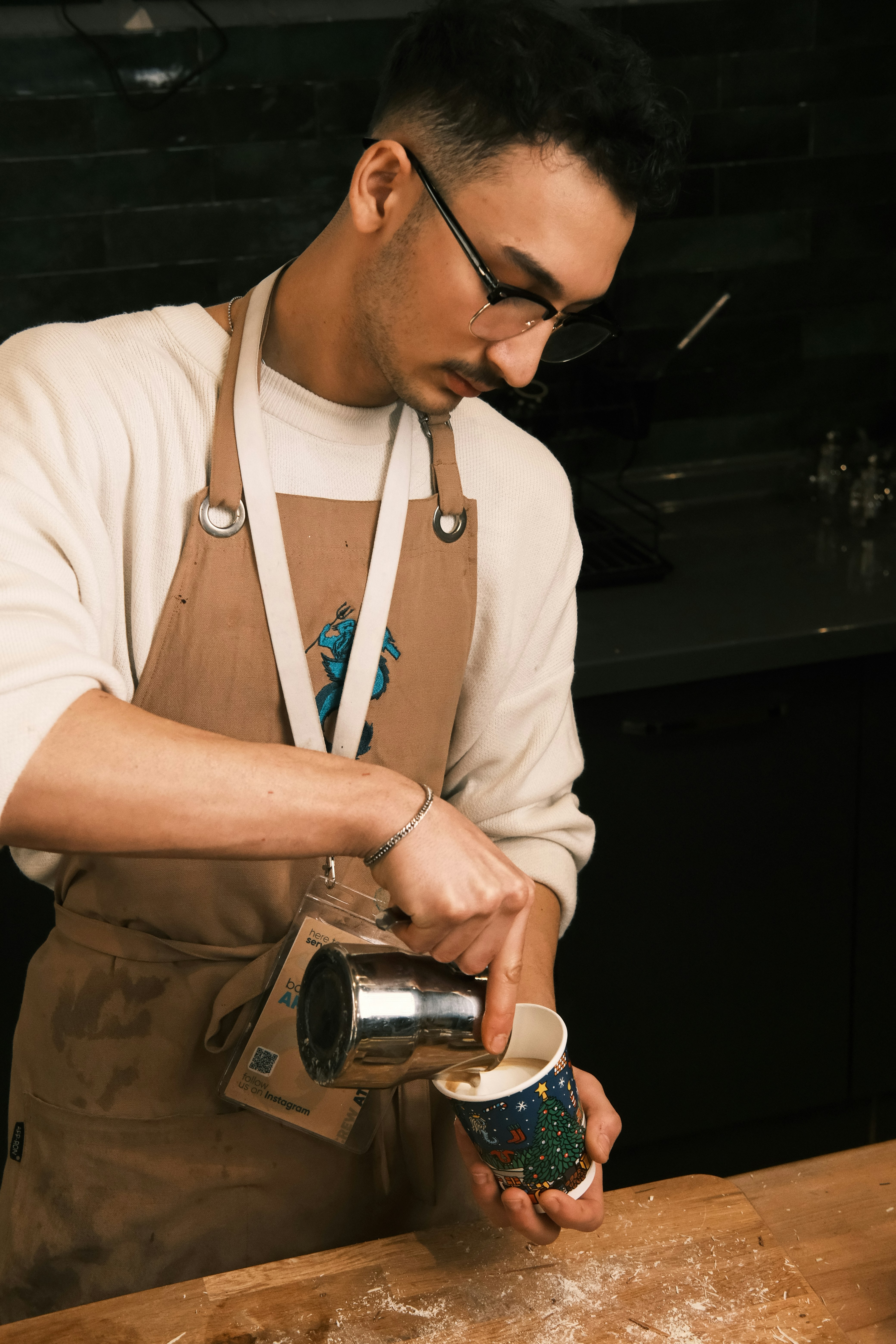 Barista at Work: Focused Pour with a Ceramic Cup