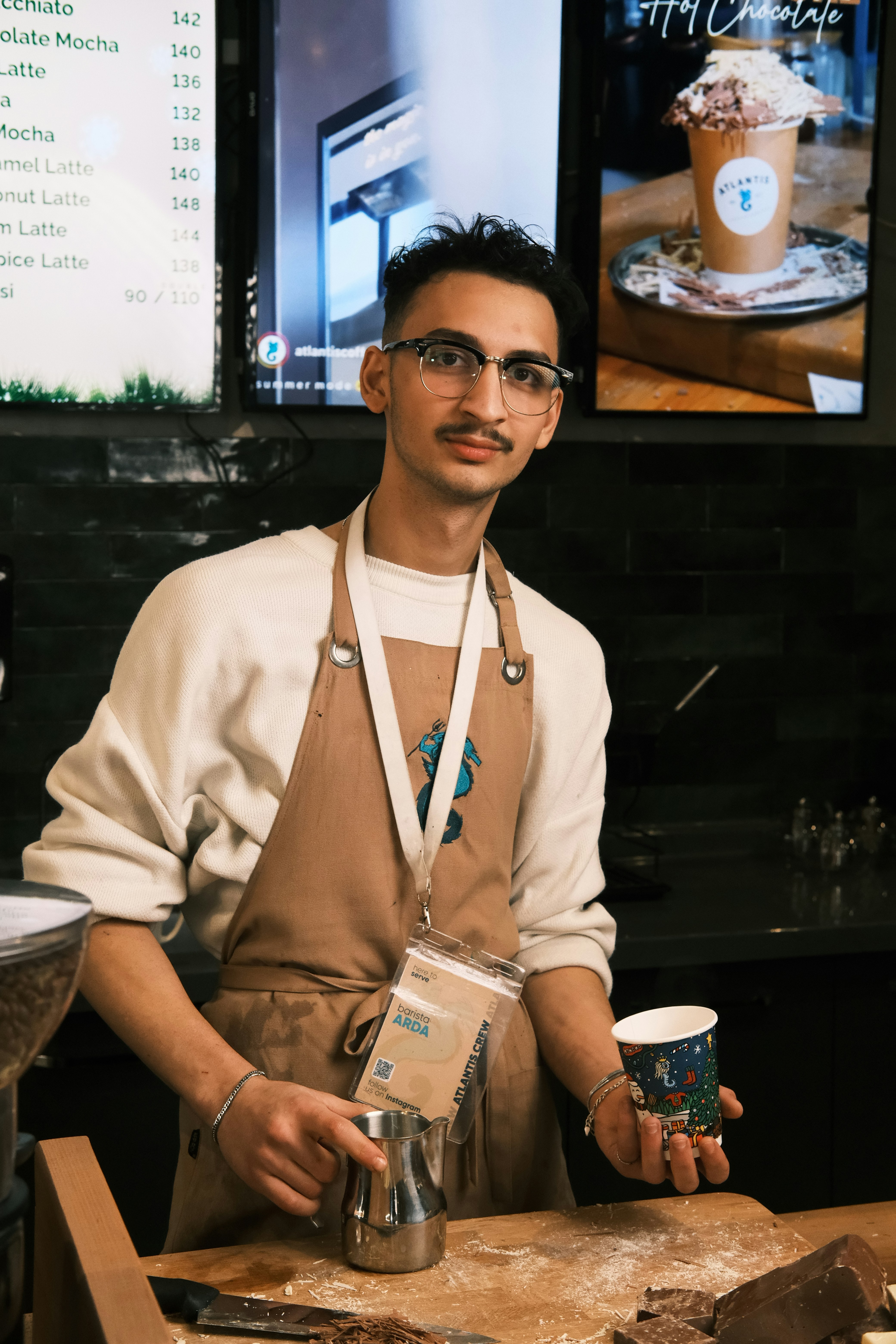 barista making froth art