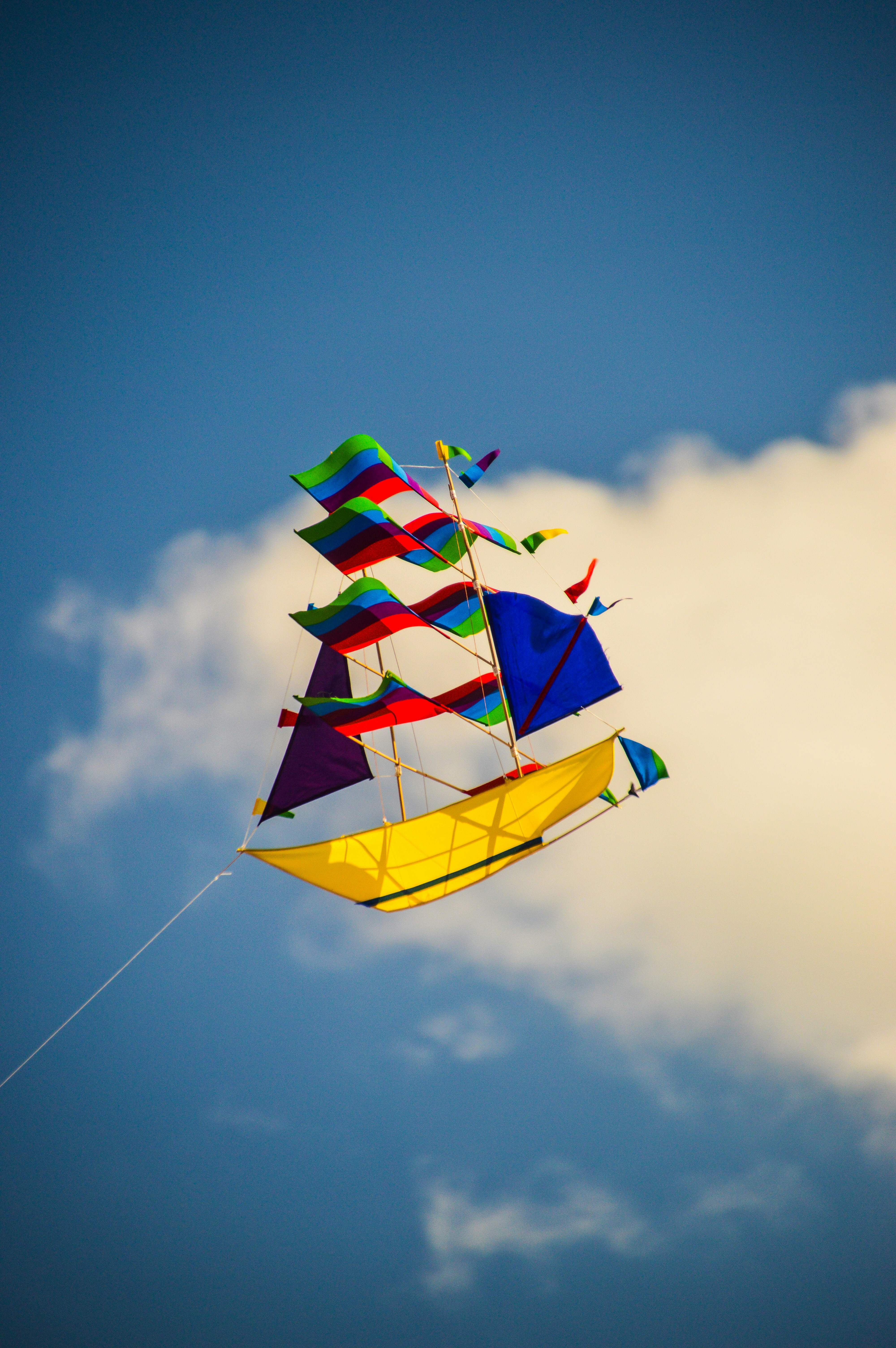Prismatic Kite Dancing through a Cerulean Sky