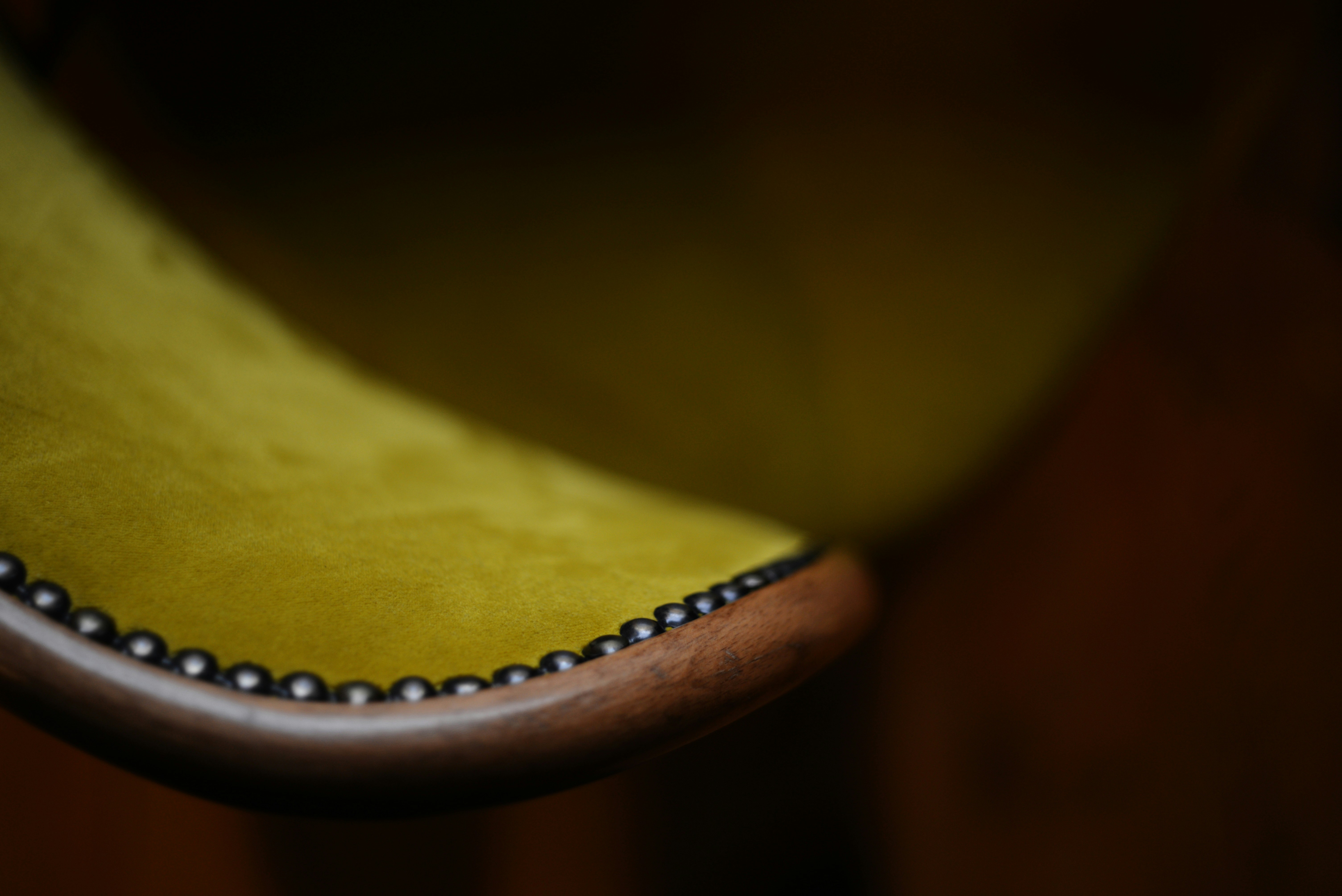 Edge of Craft: A Studded Leather Crescent in Quiet Light