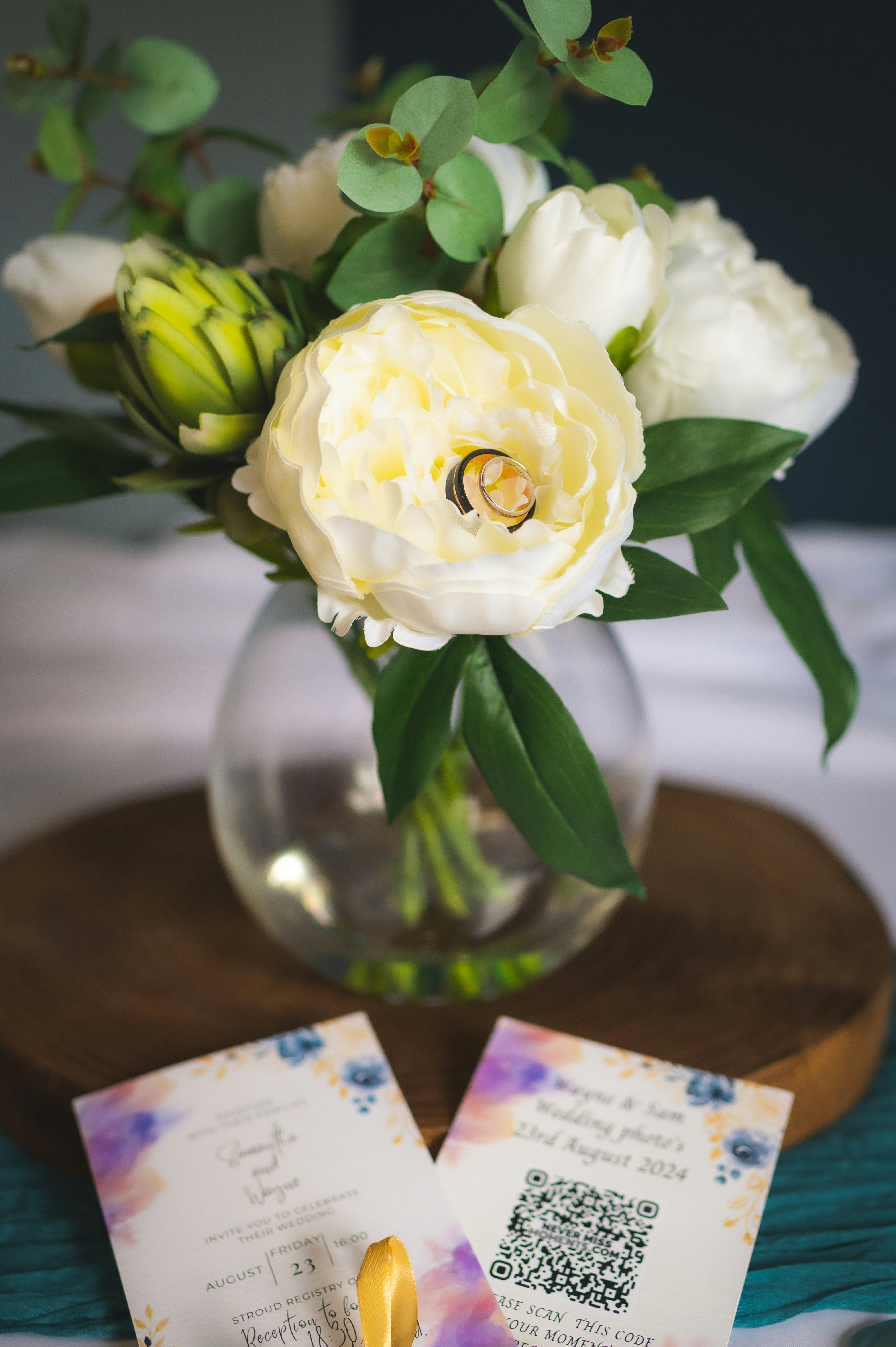 Ivory Peony Cradle: A Gold Ring Among Petals