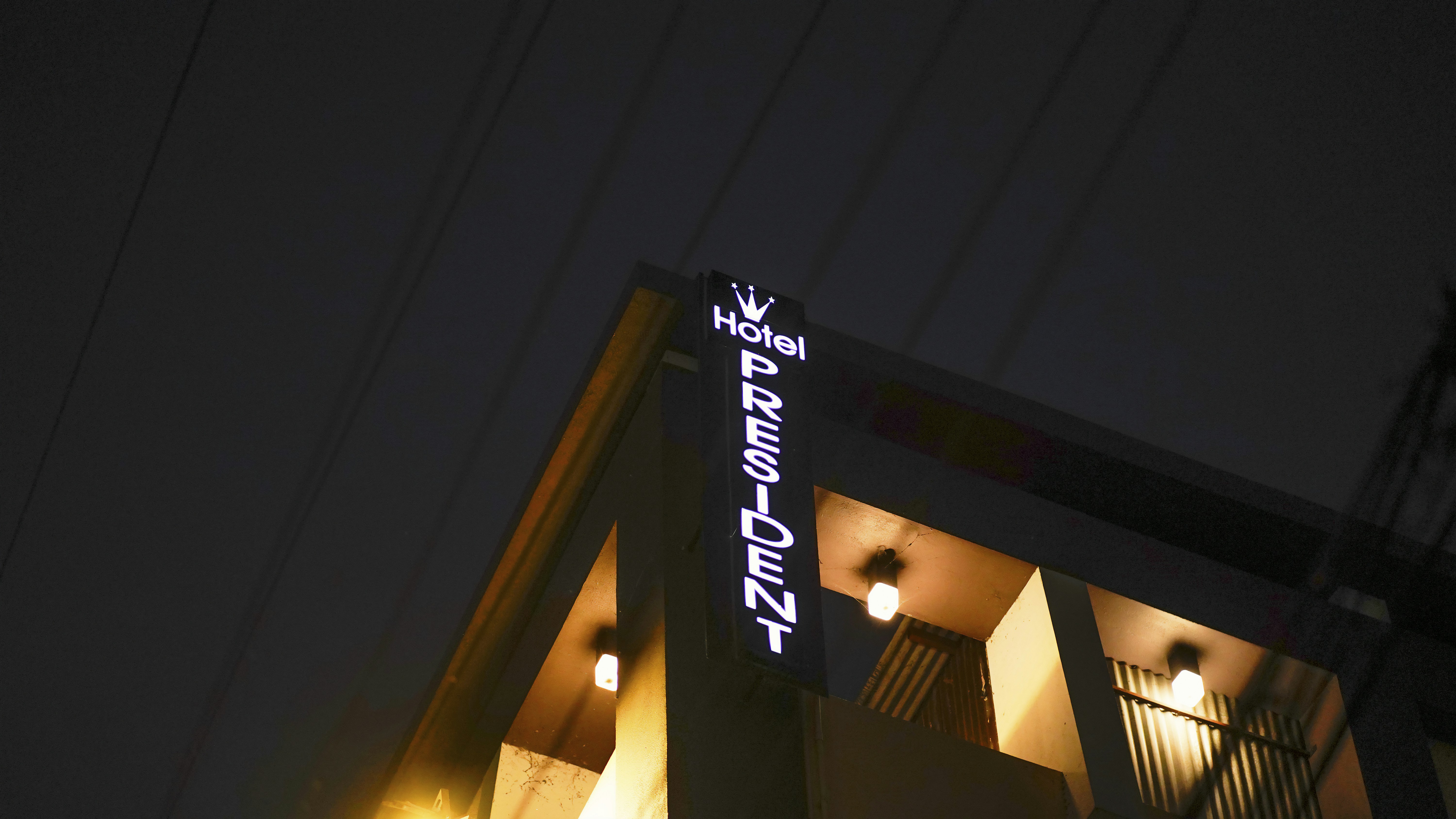 Illuminated Elegance: The President Hotel at Night