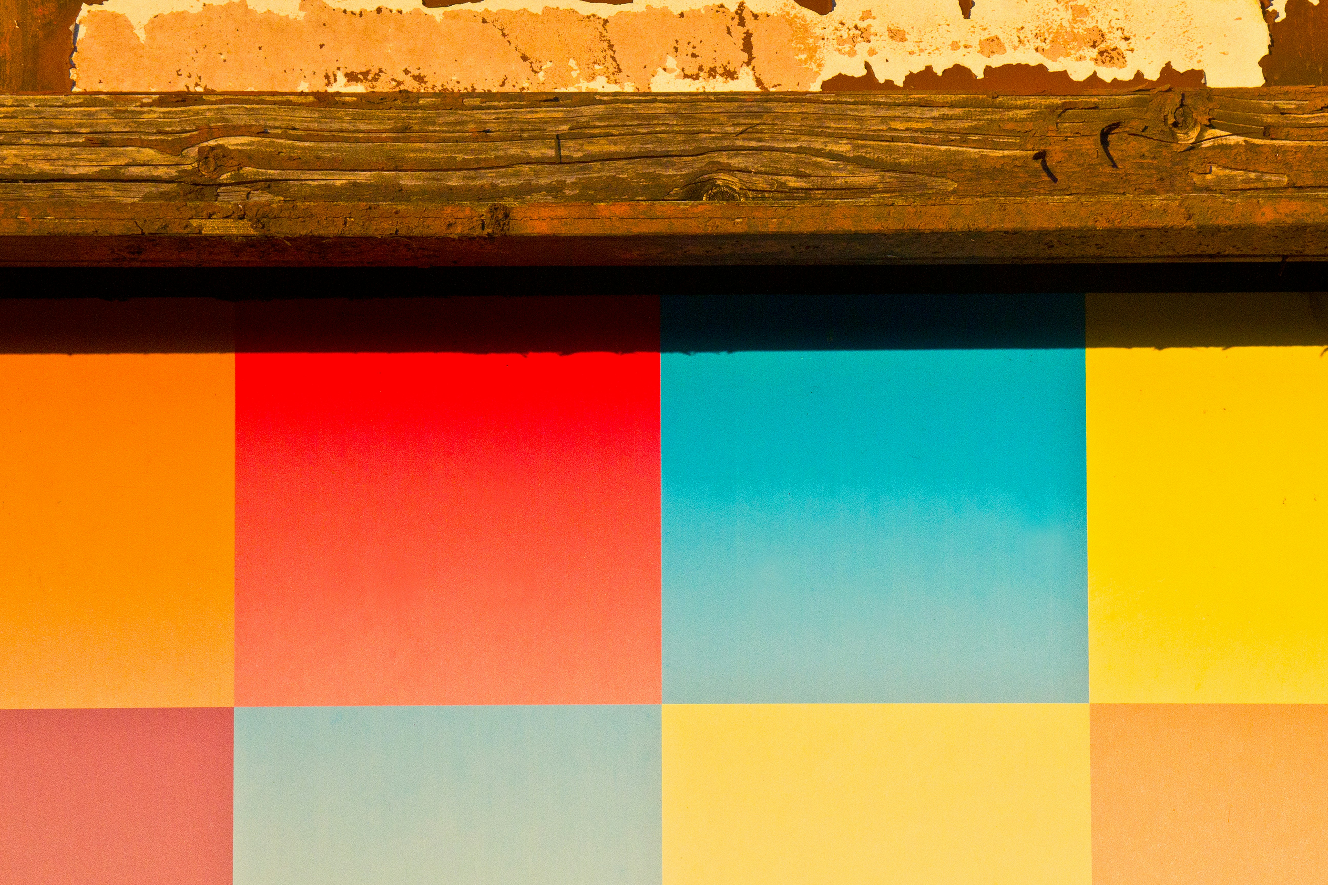 A close up of a colorful wall with a wooden frame photo – Free Almelo ...