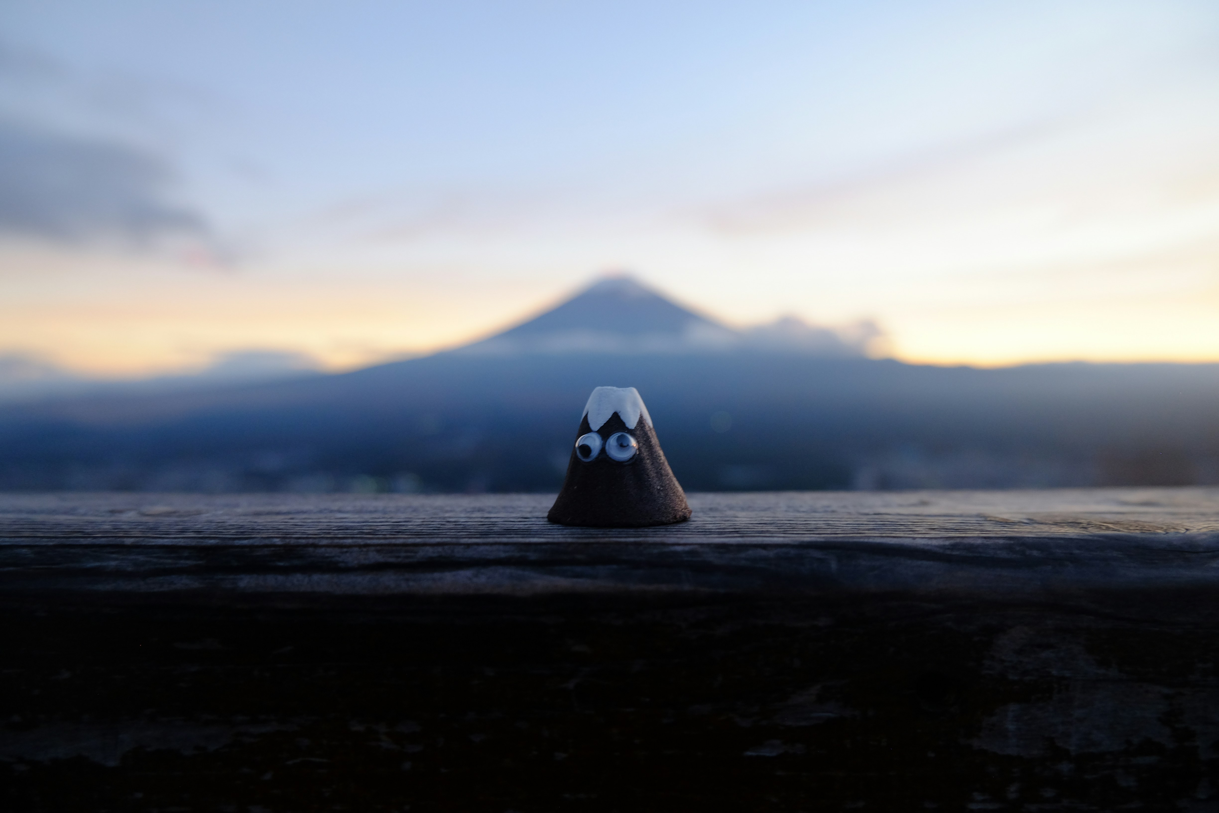 A strange looking object in the middle of a body of water
