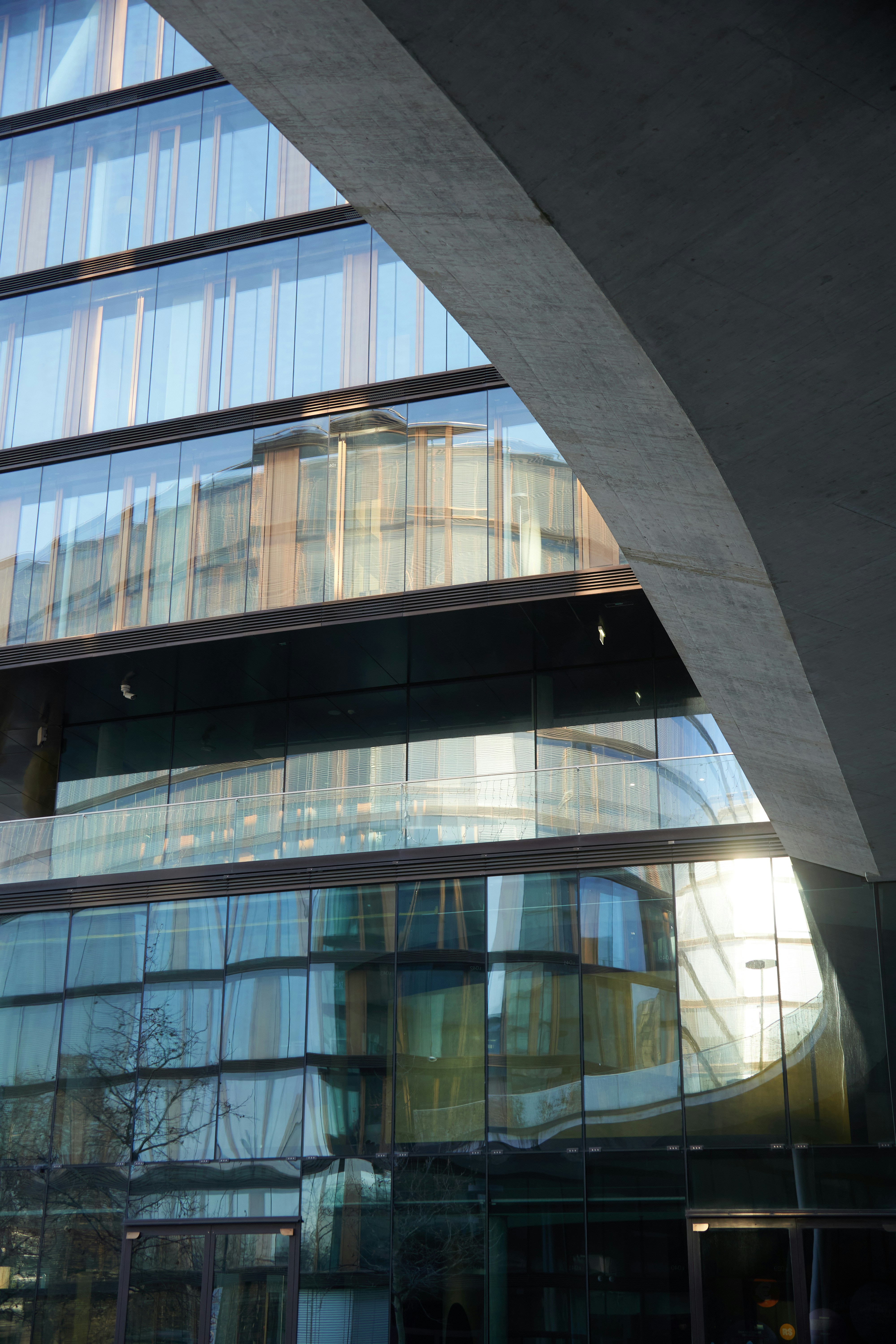 A very tall building with a very large window photo – Free Vienna Image ...