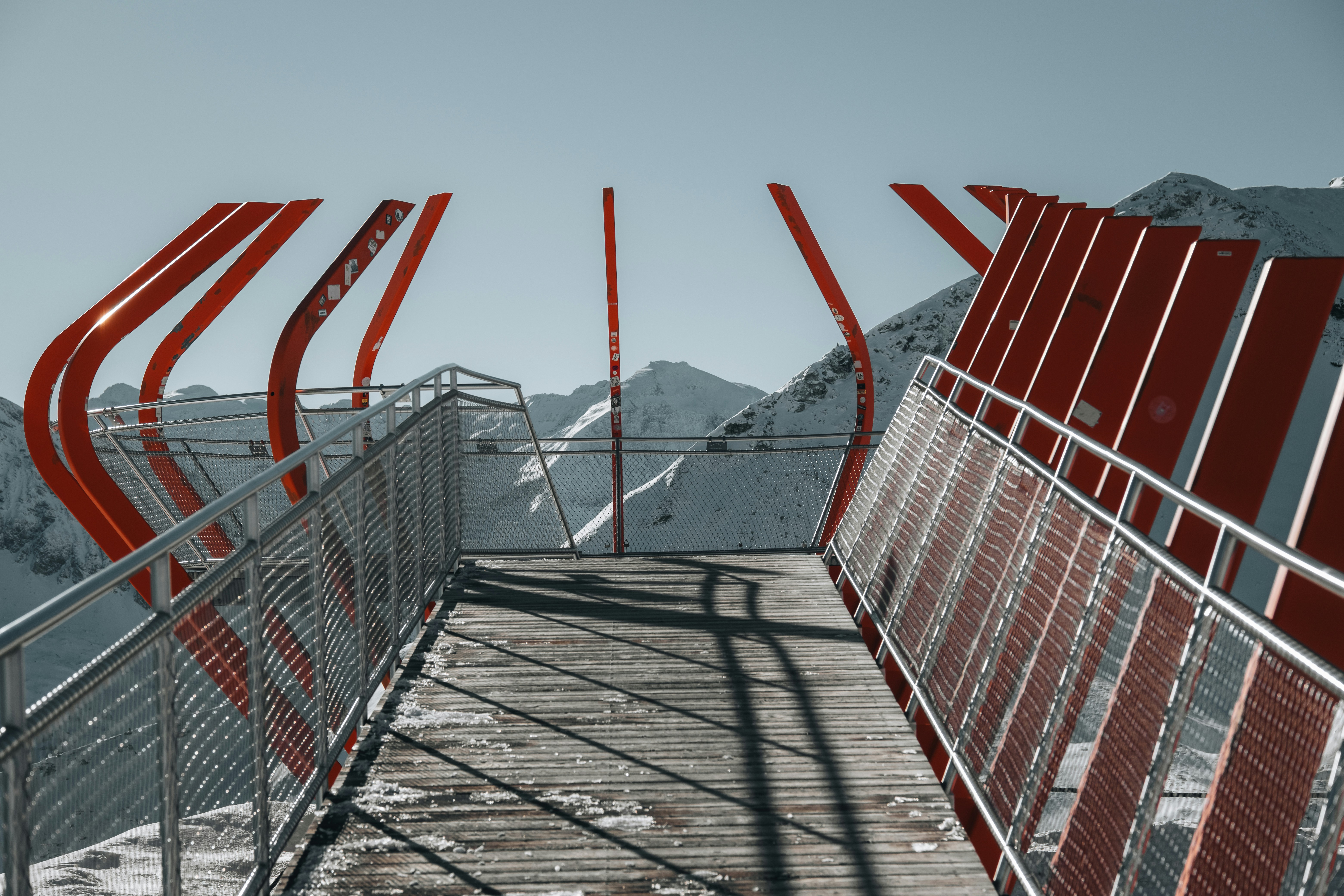 Crimson Arcs Over Alpine Heights