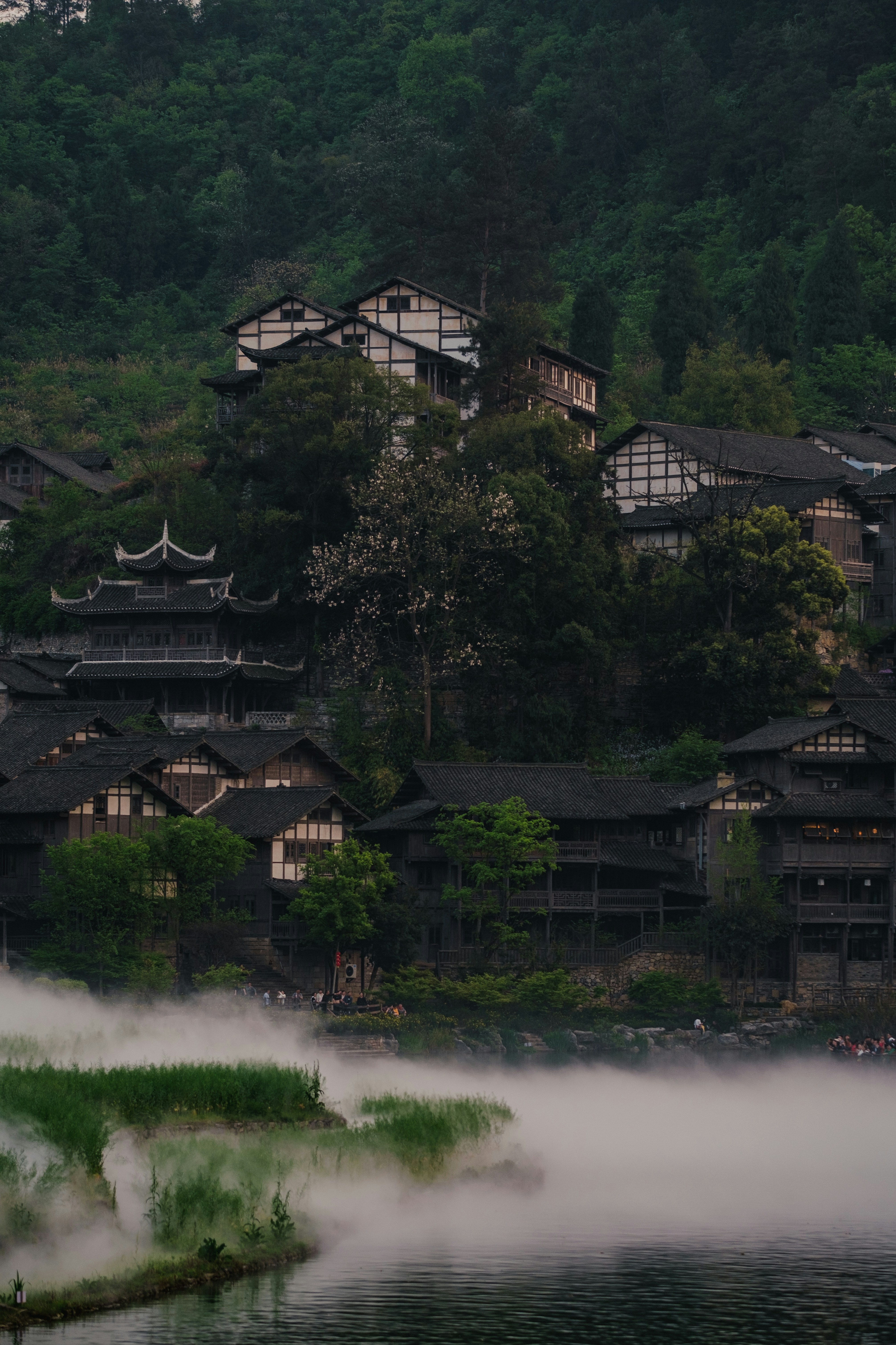 Hushed Timber Crest: A Hilltop Village Rising Through Morning Mist