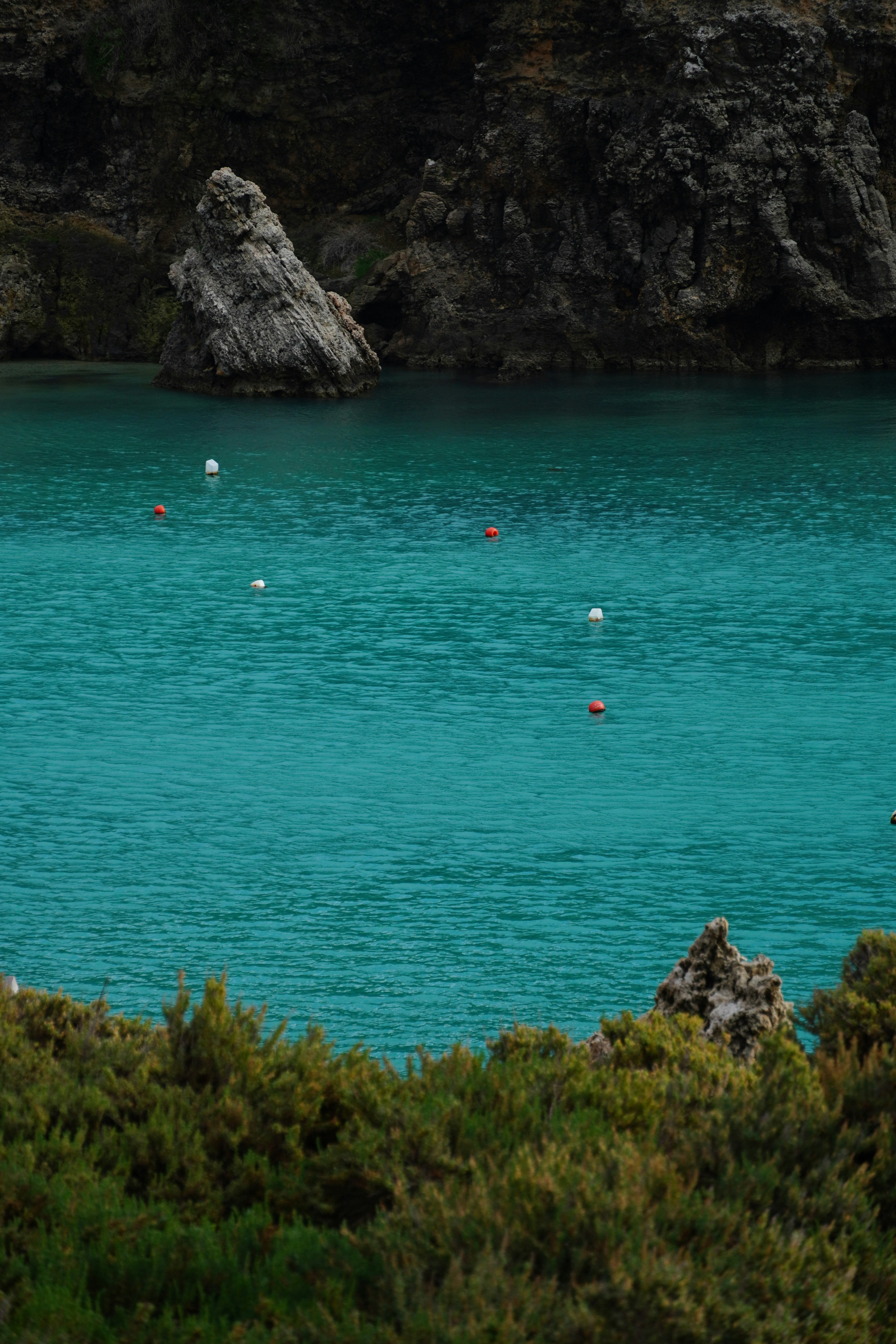 Azure Cove: turquoise water against rugged cliffs